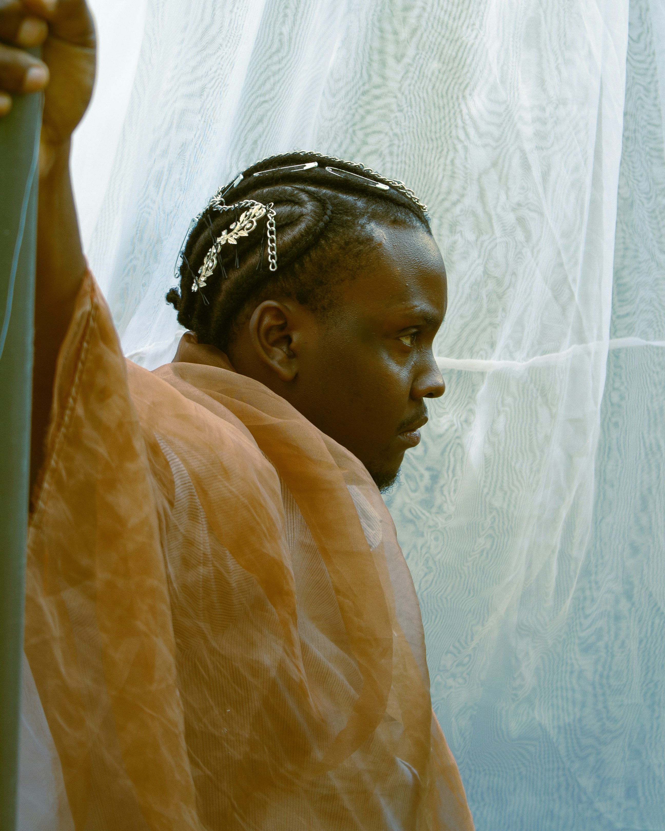 Veiled Gaze: Portrait of Quiet Strength Behind Sheer Fabric