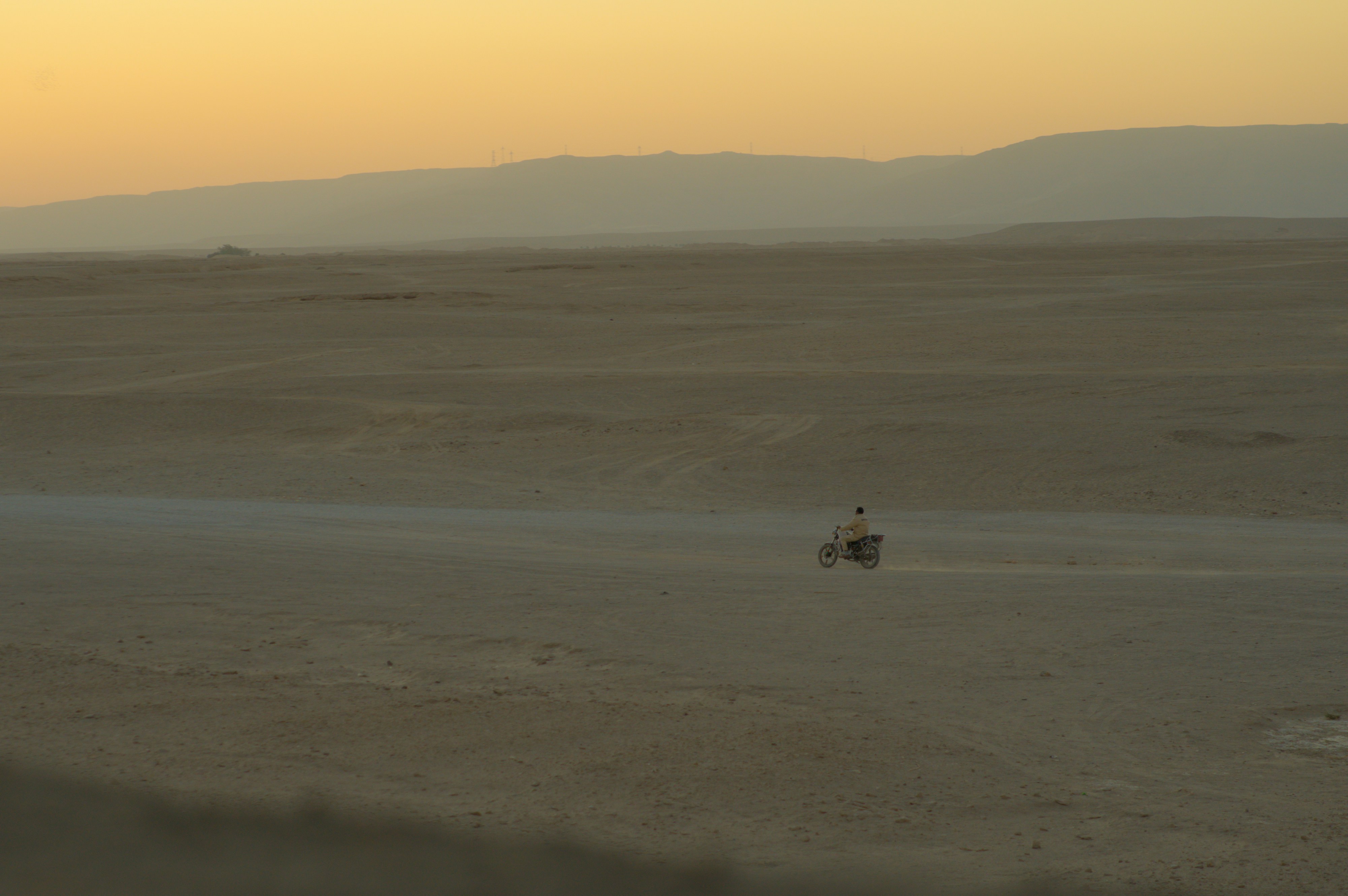 biker in the desert in egypt