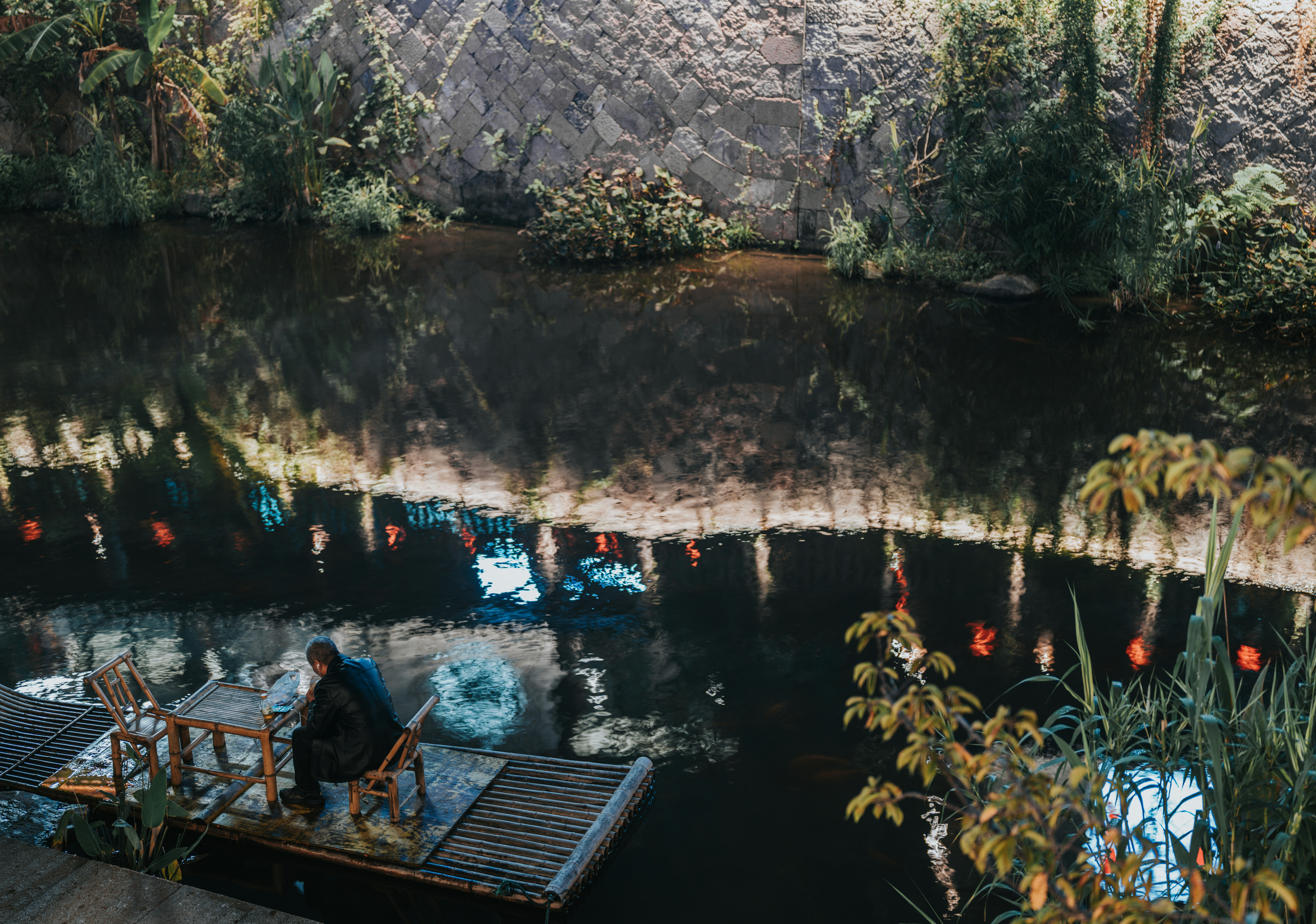 Lantern Glow on a Riverside Raft: A Quiet Moment by the Water