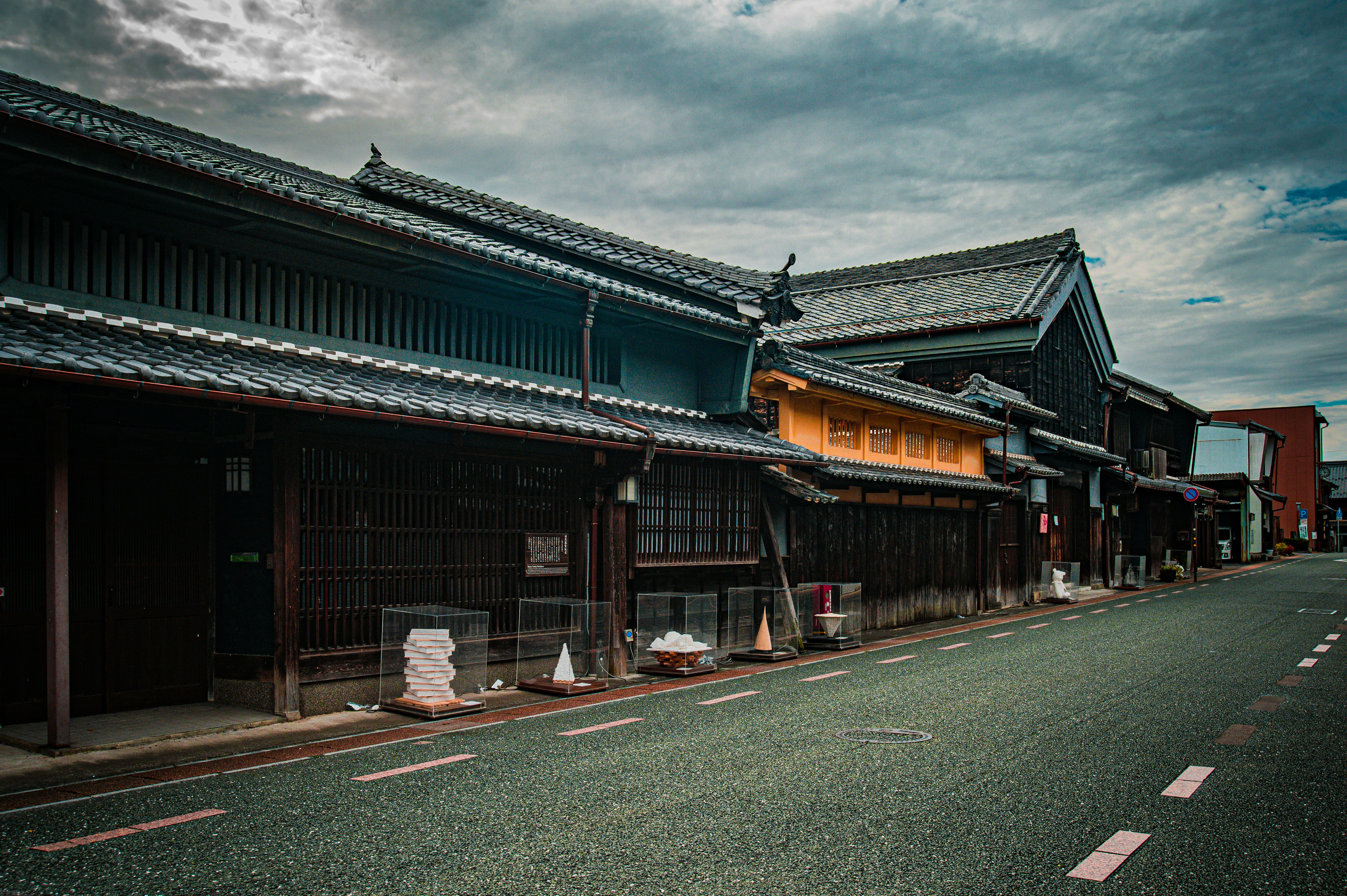 Timber Facades on a Quiet Street Under a Moody Sky