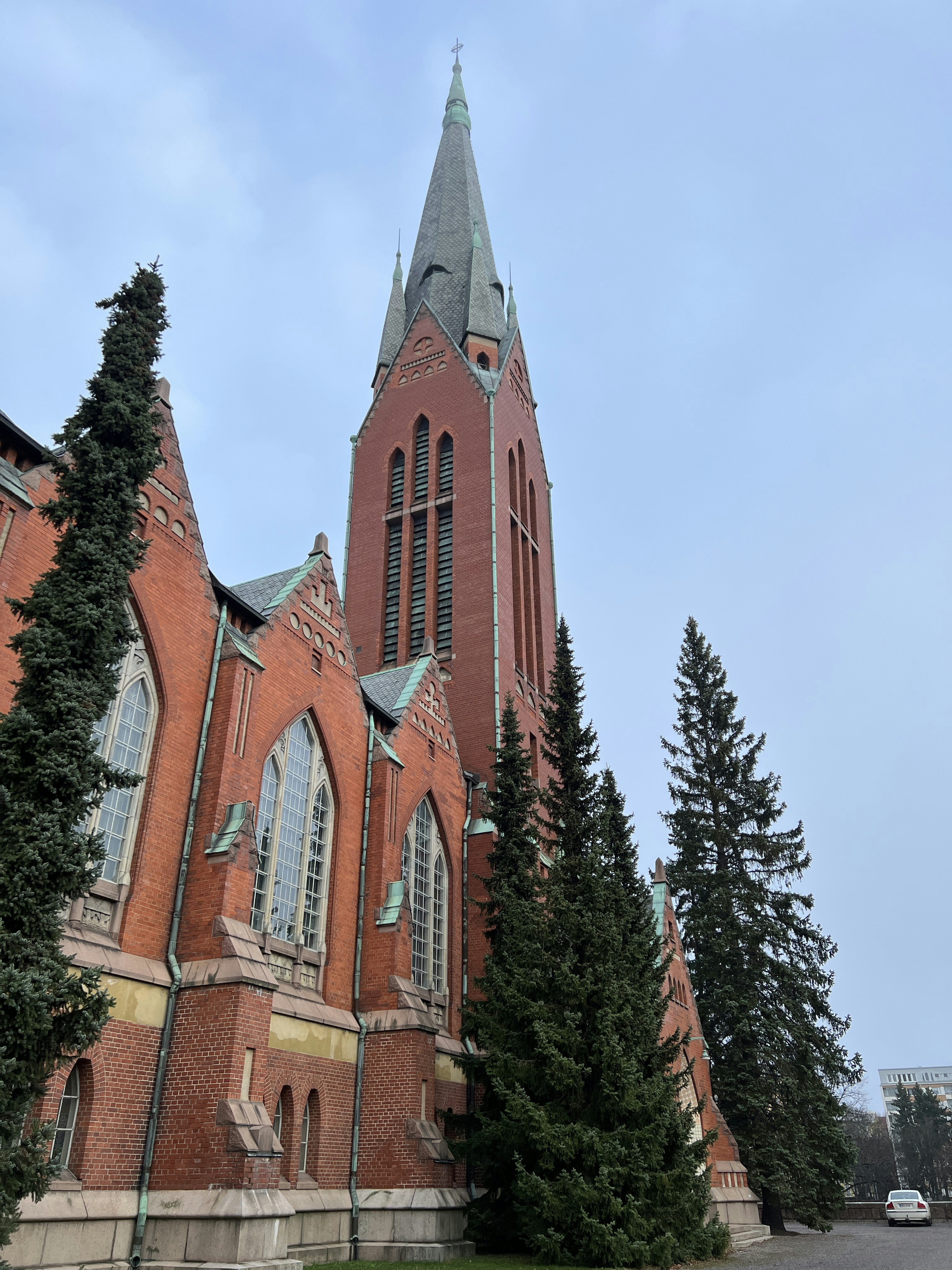 Majestic clock tower dominates the Helsinki-inspired architecture of Turku's Mikaelinkirkko church complex.