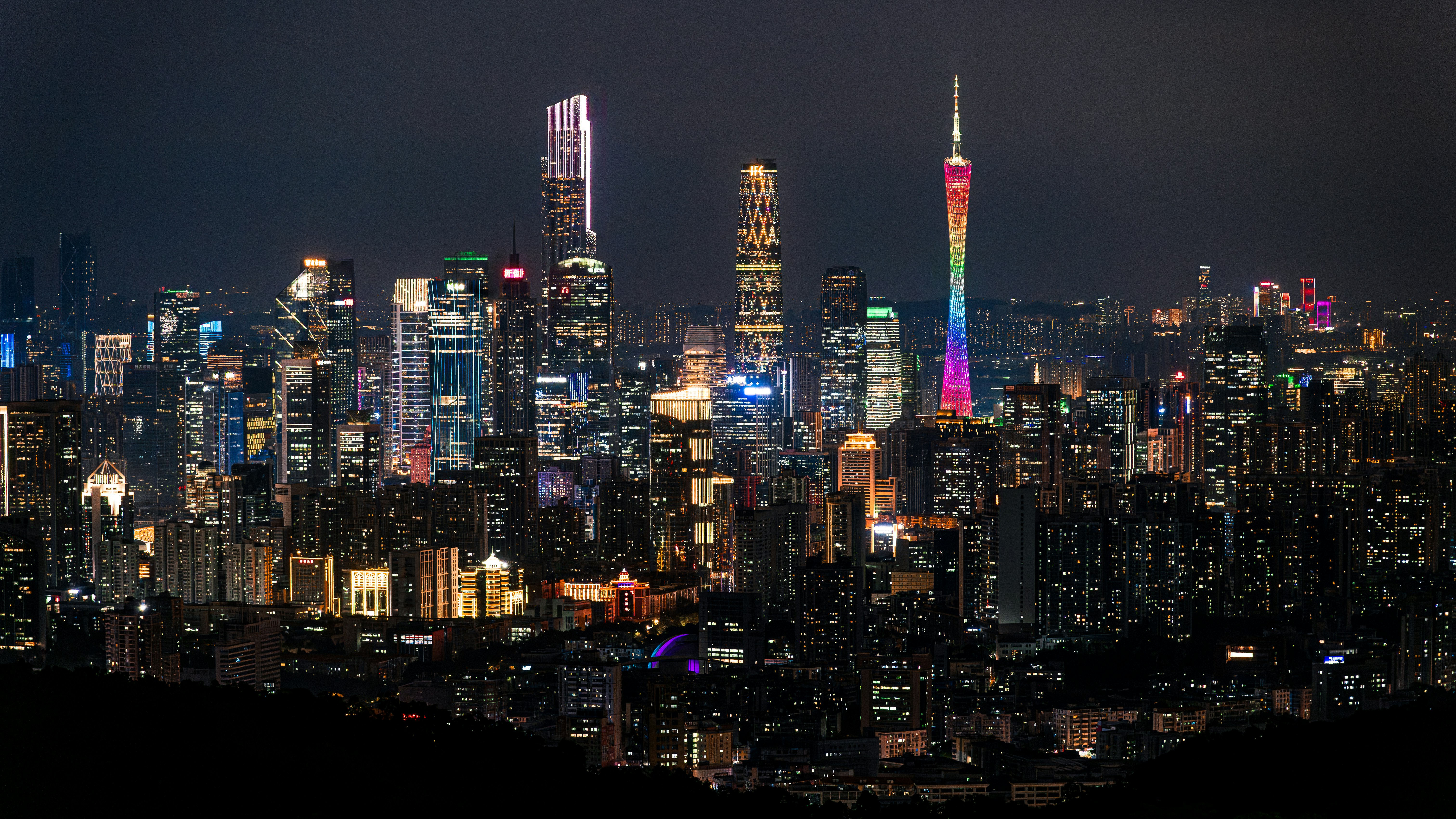 Chromatic Spire Among the Nightfall Skyline