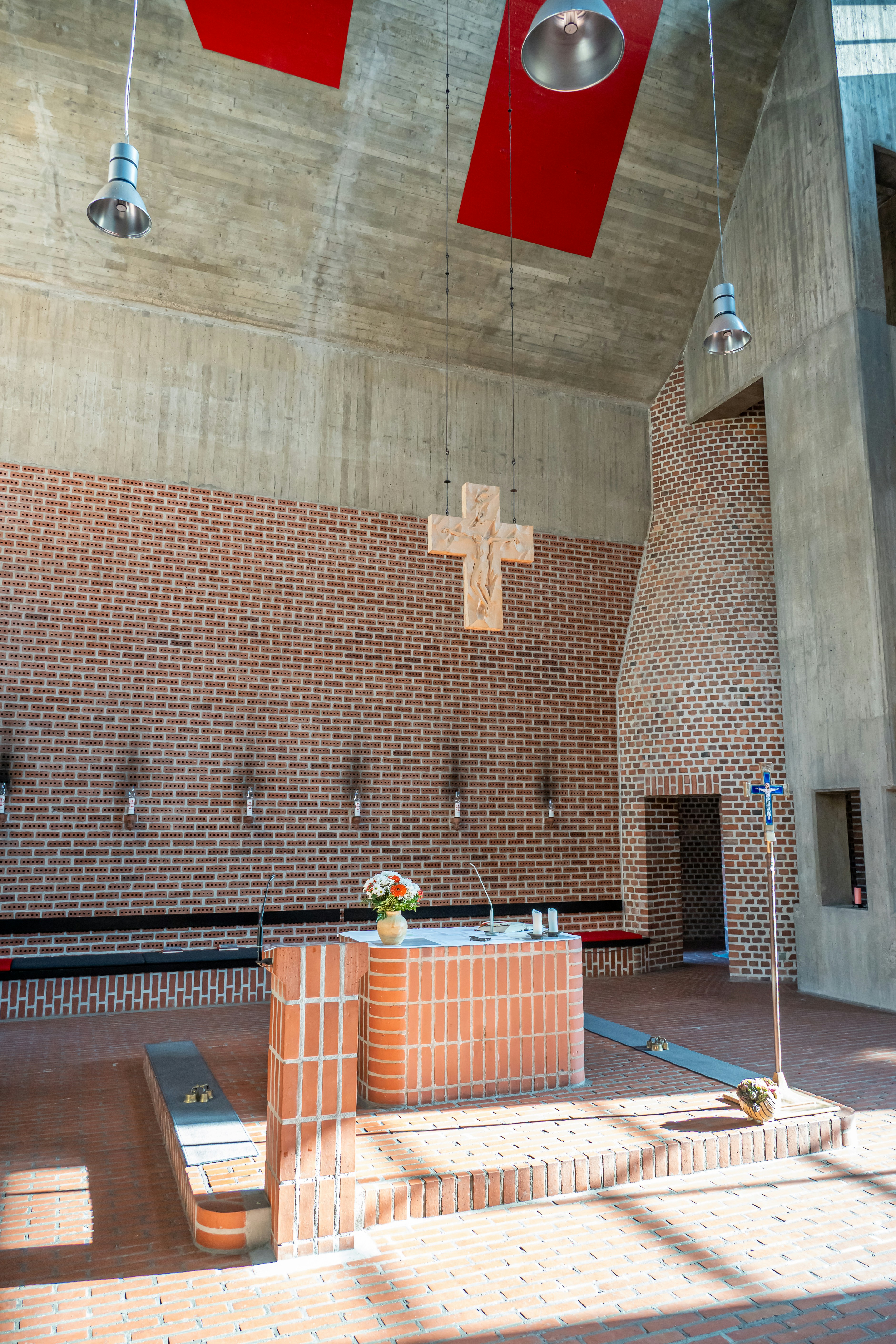 Crosslight Over Brick Altar: Quiet Geometry in a Modern Chapel