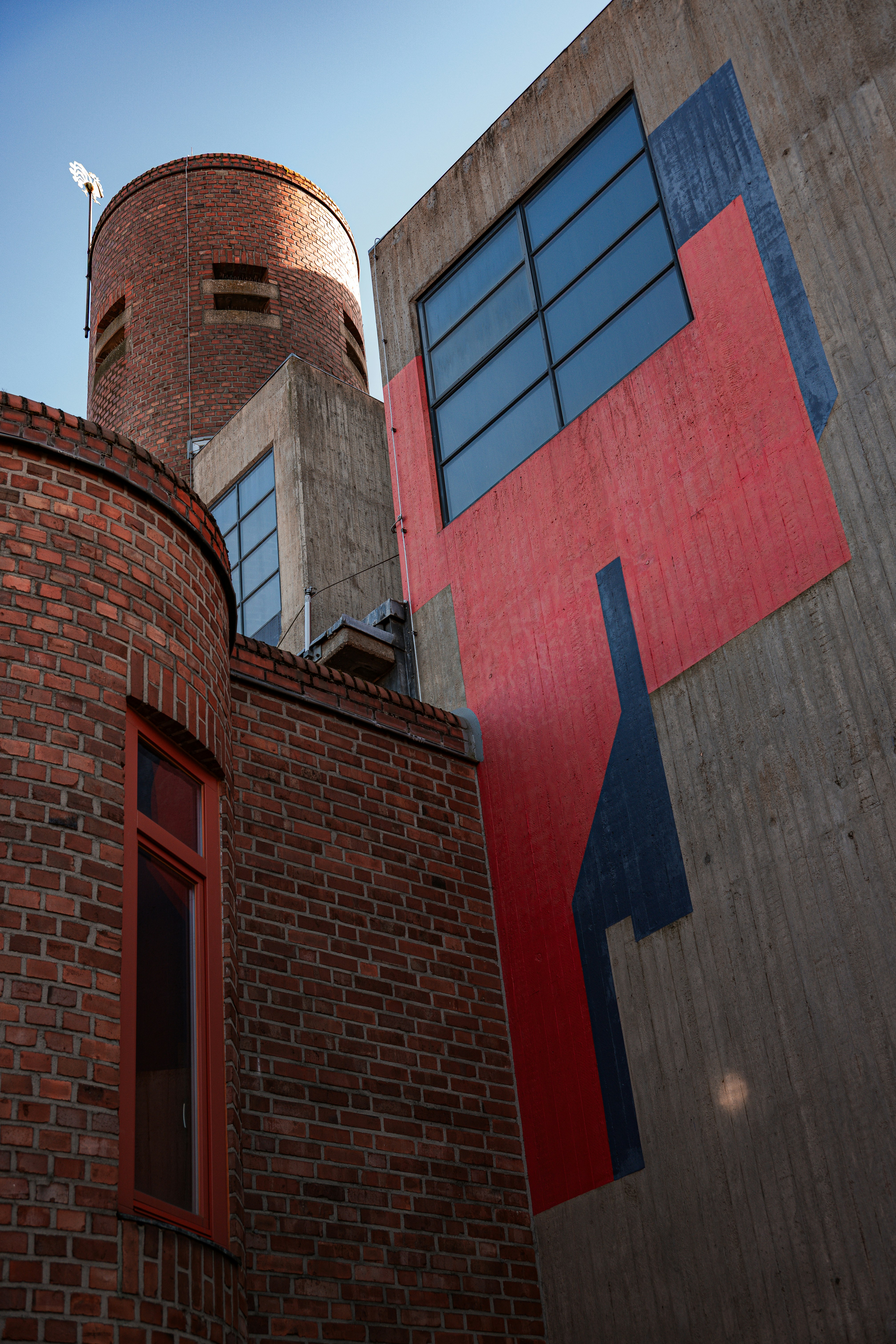 Geometry in Red Brick: A Low-Angle Portrait of Modern Facades