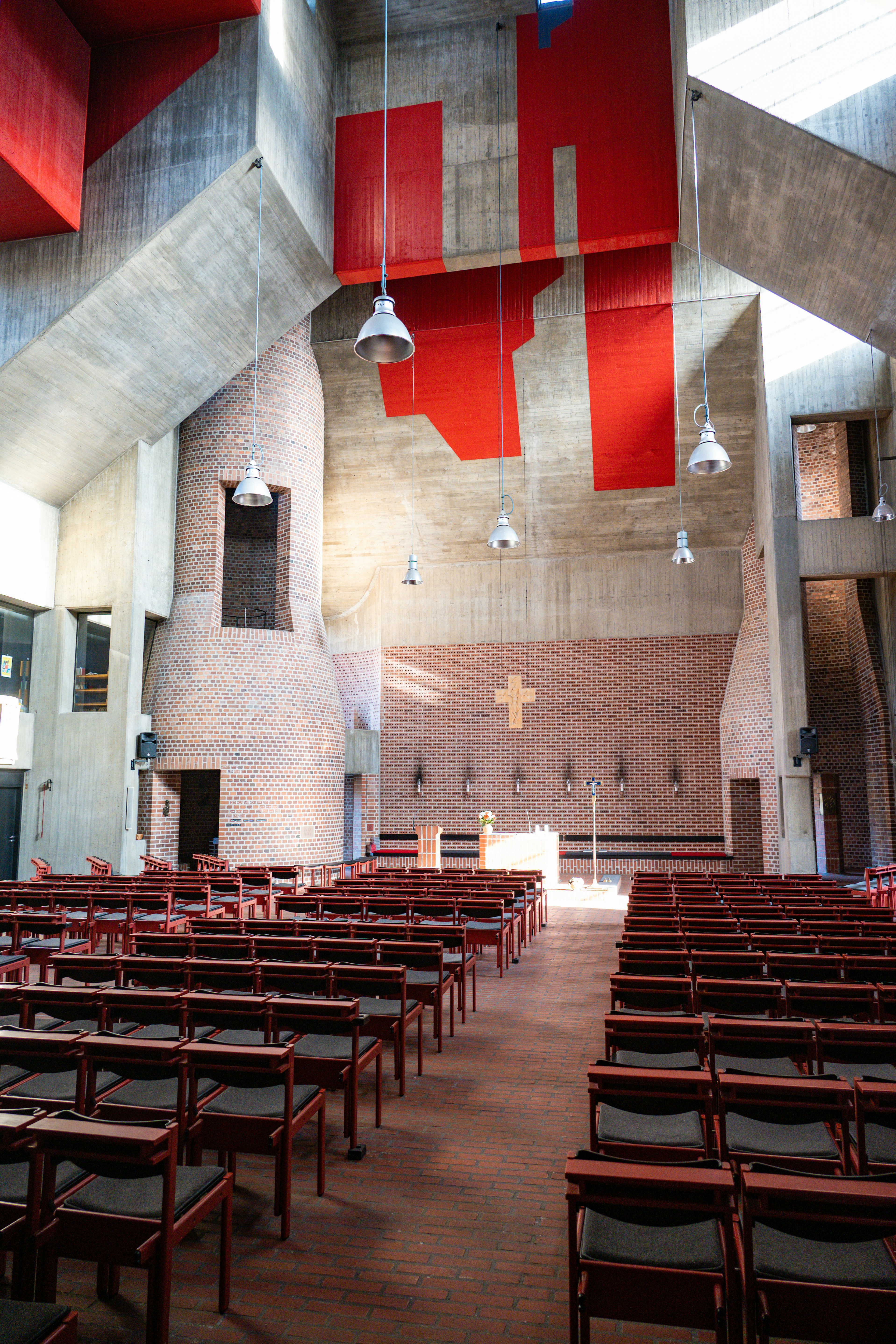Concrete Cathedral: Red Weaves and Quiet Rows