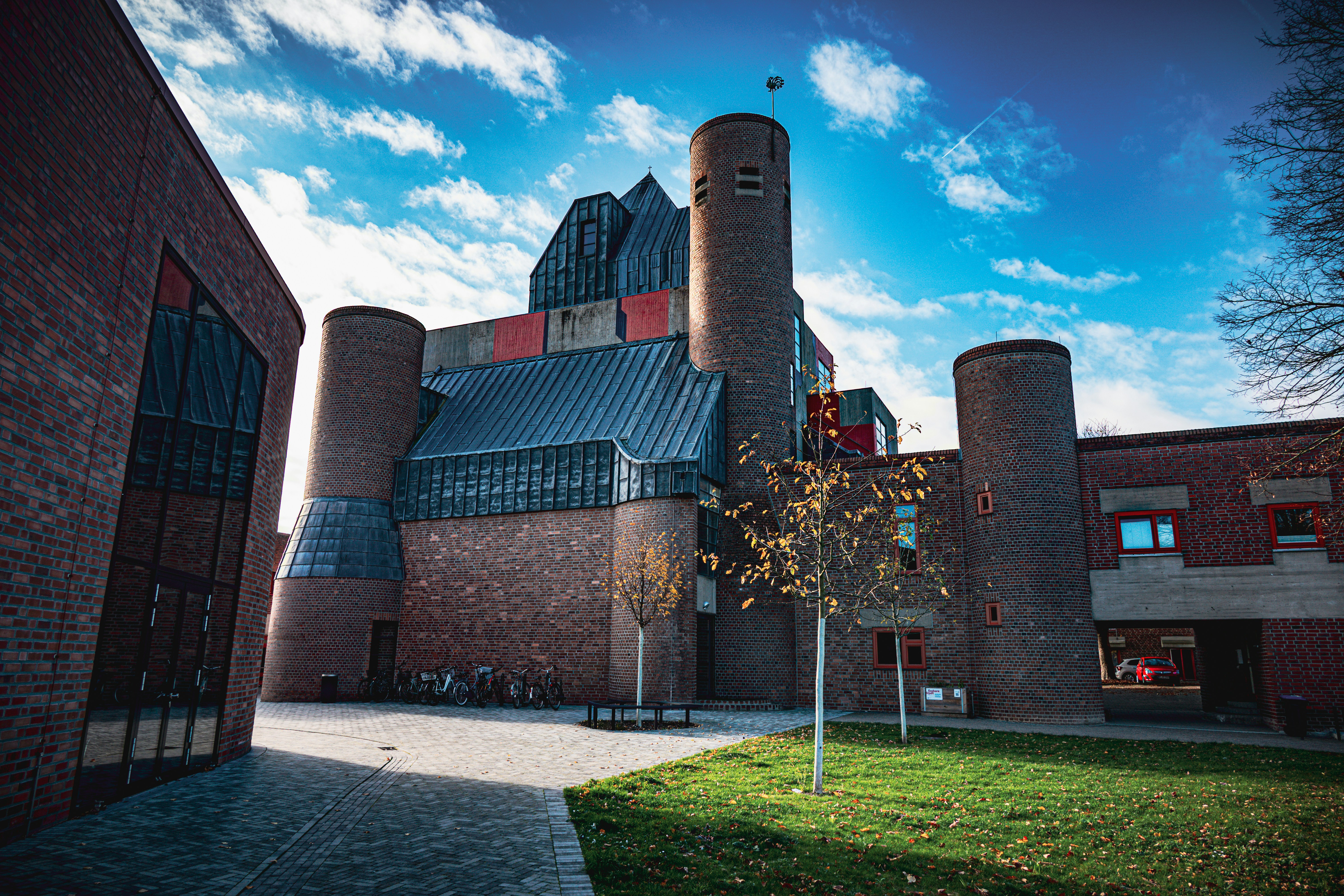 Cylindrical Towers under a Cerulean Sky: A Brick Campus Courtyard