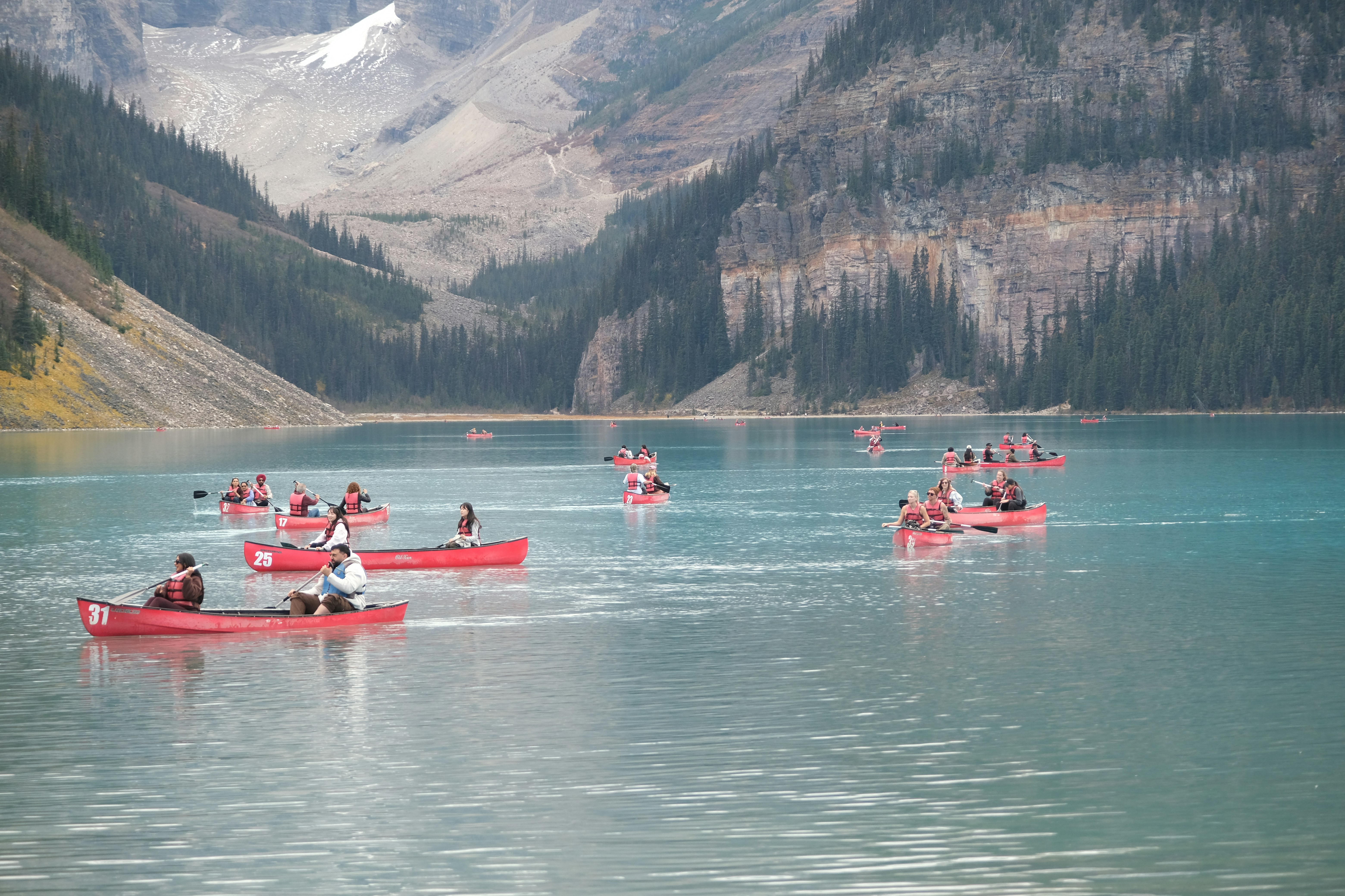 Emerald Lake’s Red Canoe Armada Under Alpine Peaks