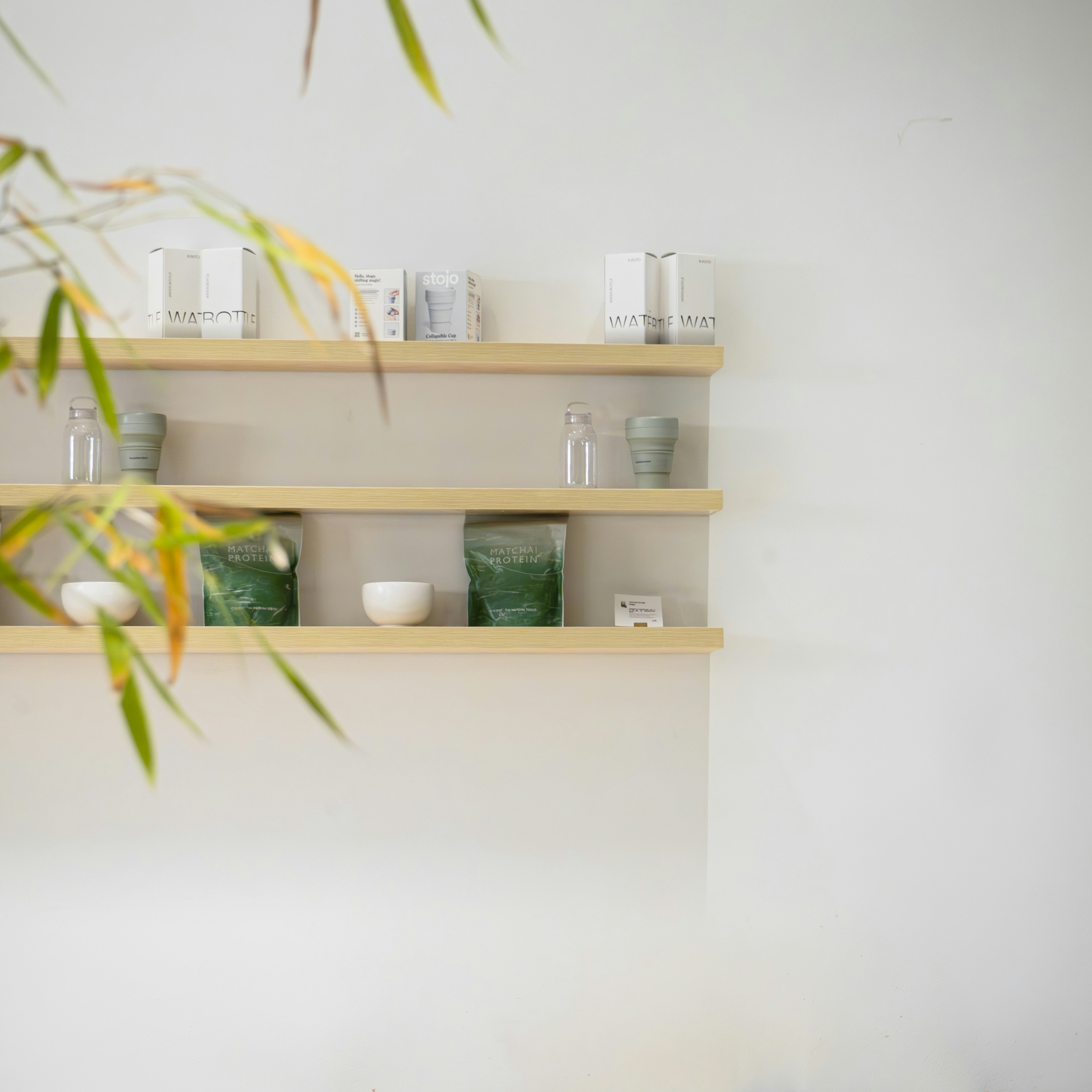 A minimalist interior shelf with items.