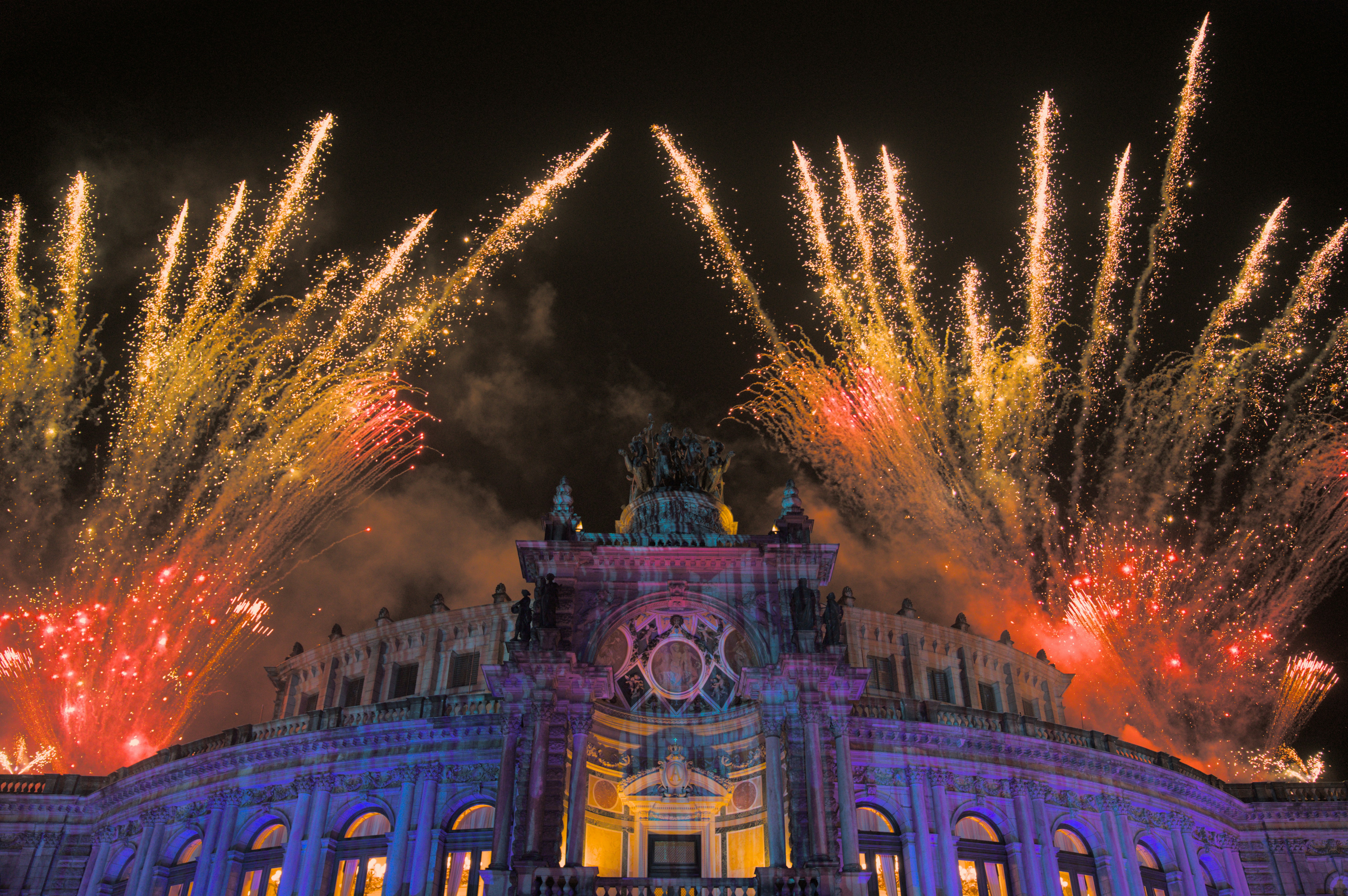 Crested City Hall Under a Firework Crown
