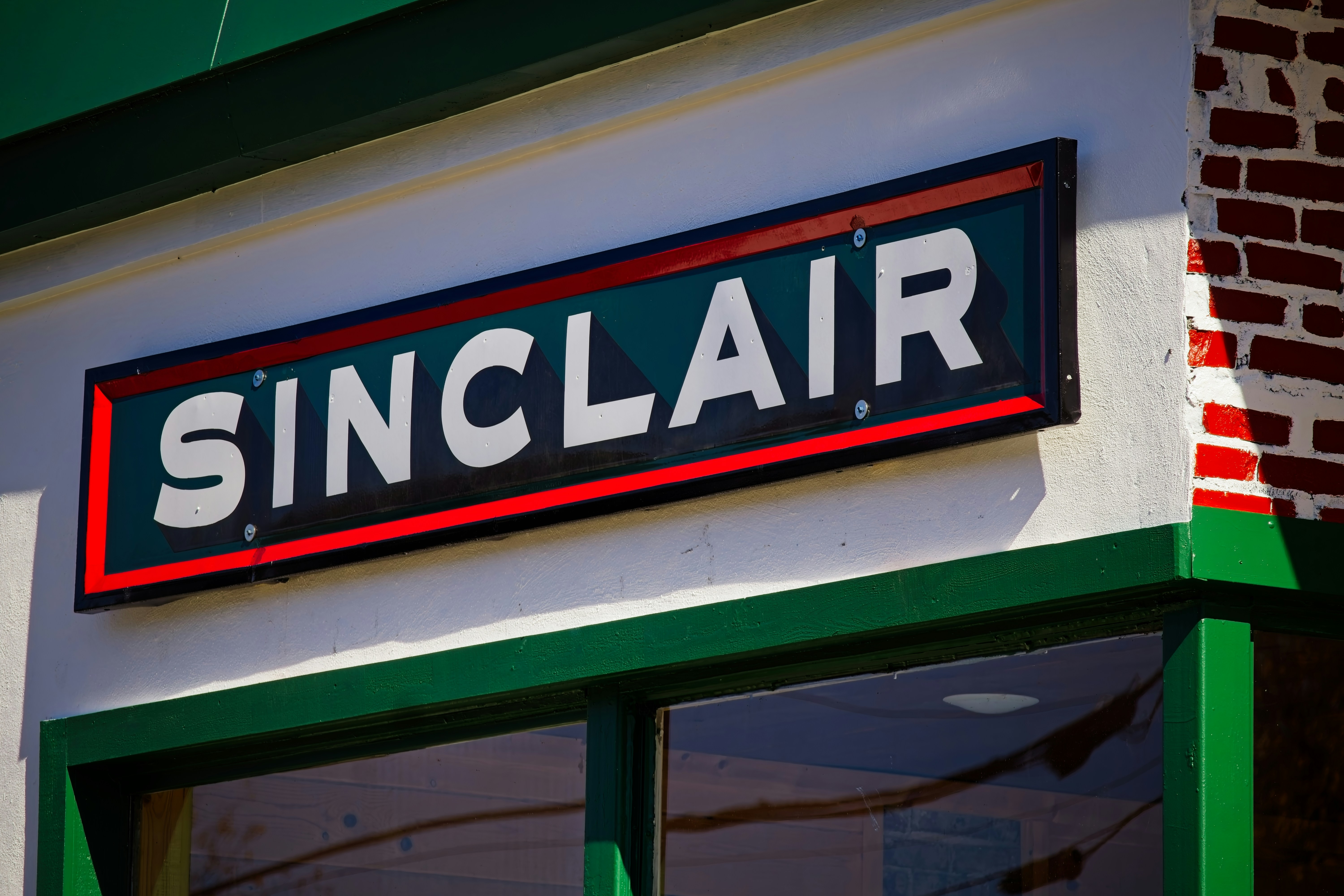 A Sinclair gas station sign.