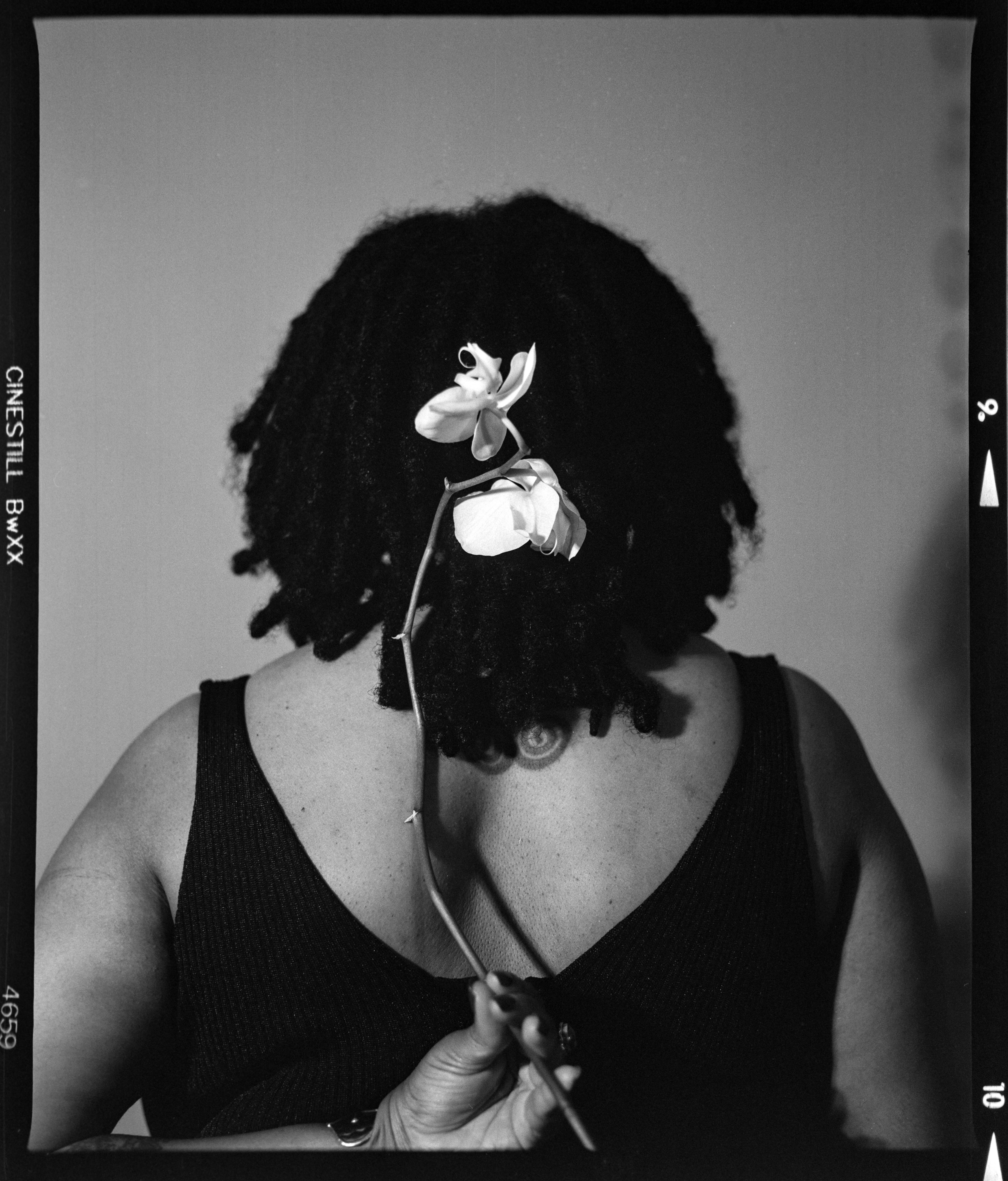 Bloom in the Back: Flower Brings Focus to the Nape