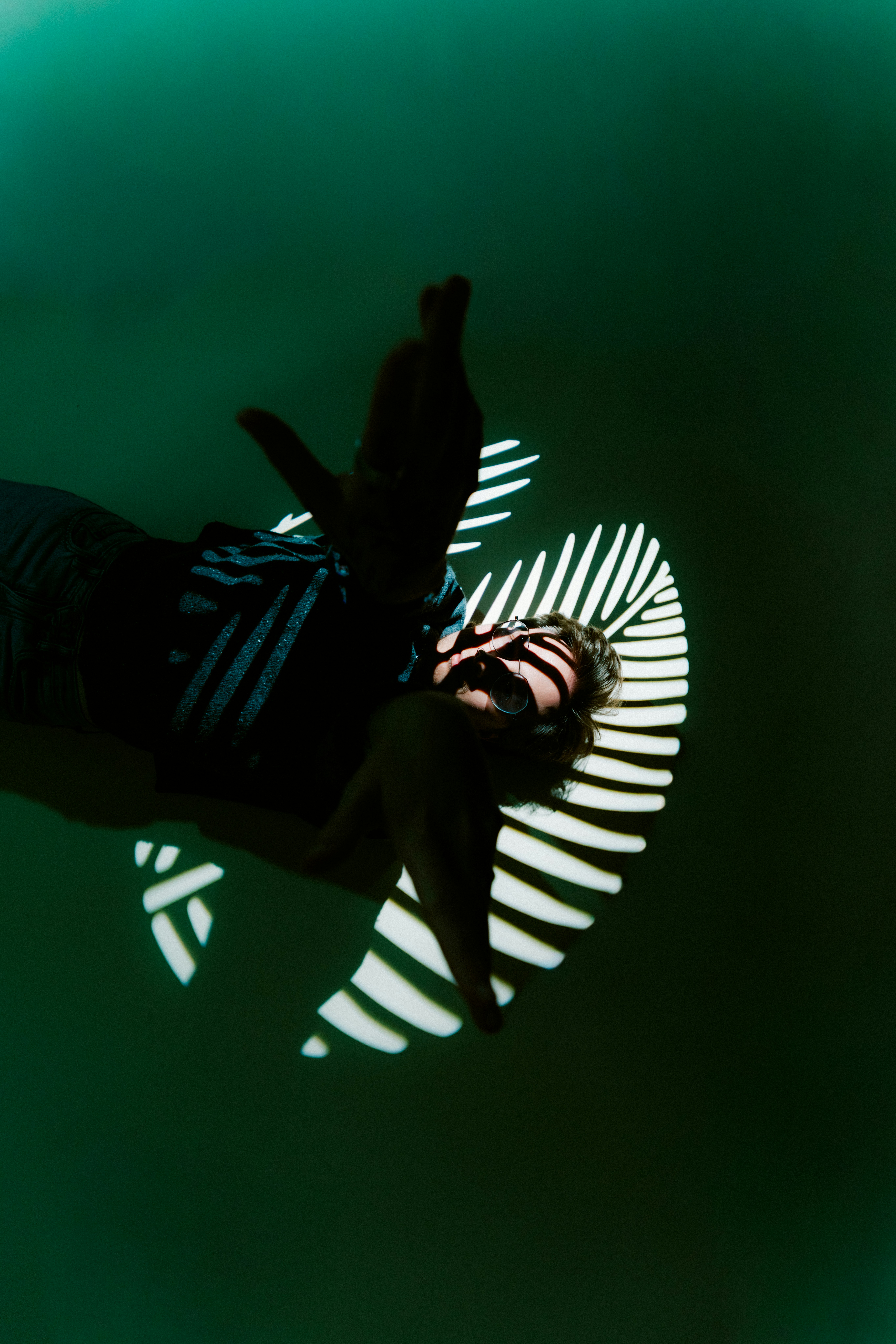 Radial Halo: A Submerged Portrait with a Ring of Light