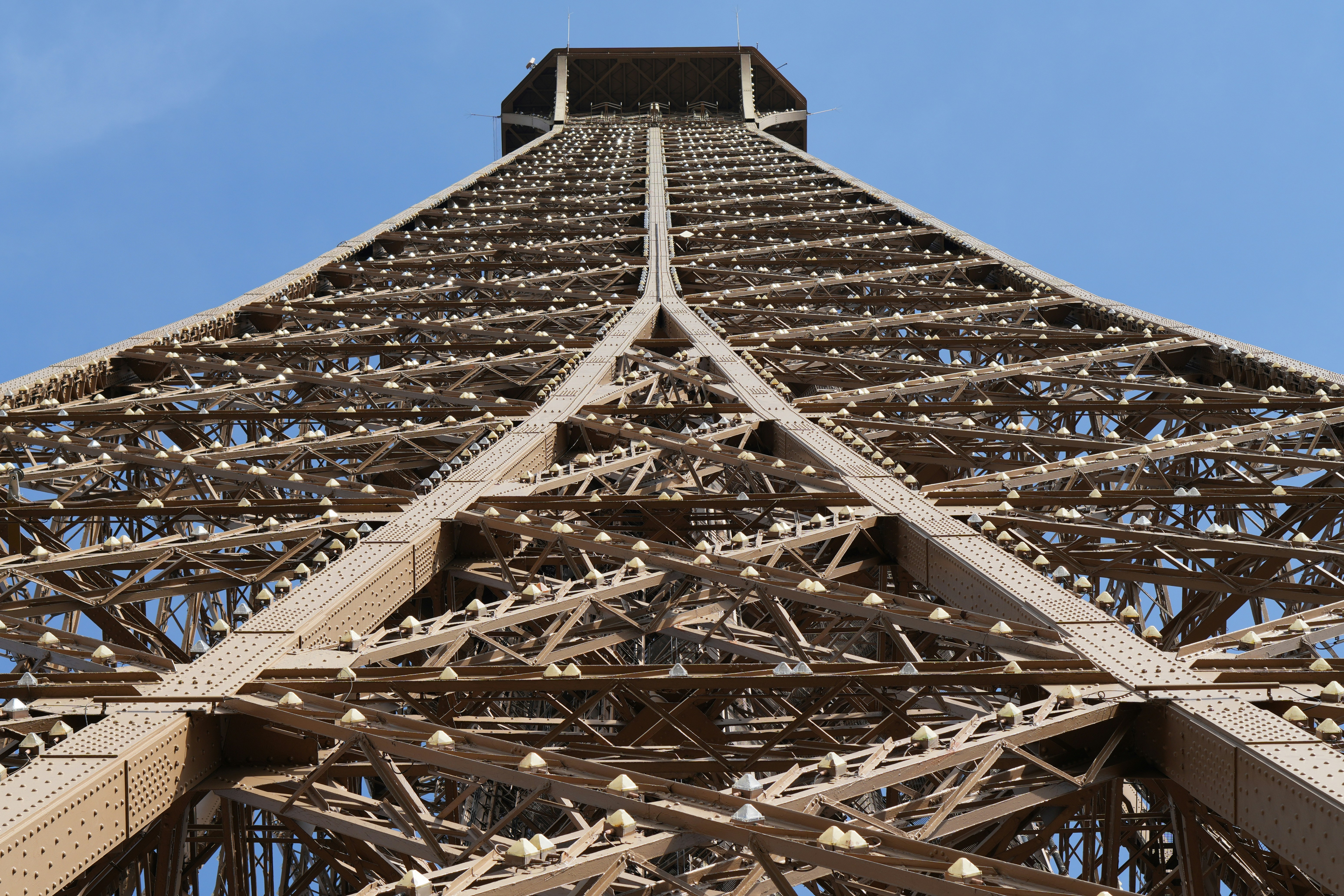 Iron Lace Ascension: A Base-to-Sky View of the Eiffel Tower
