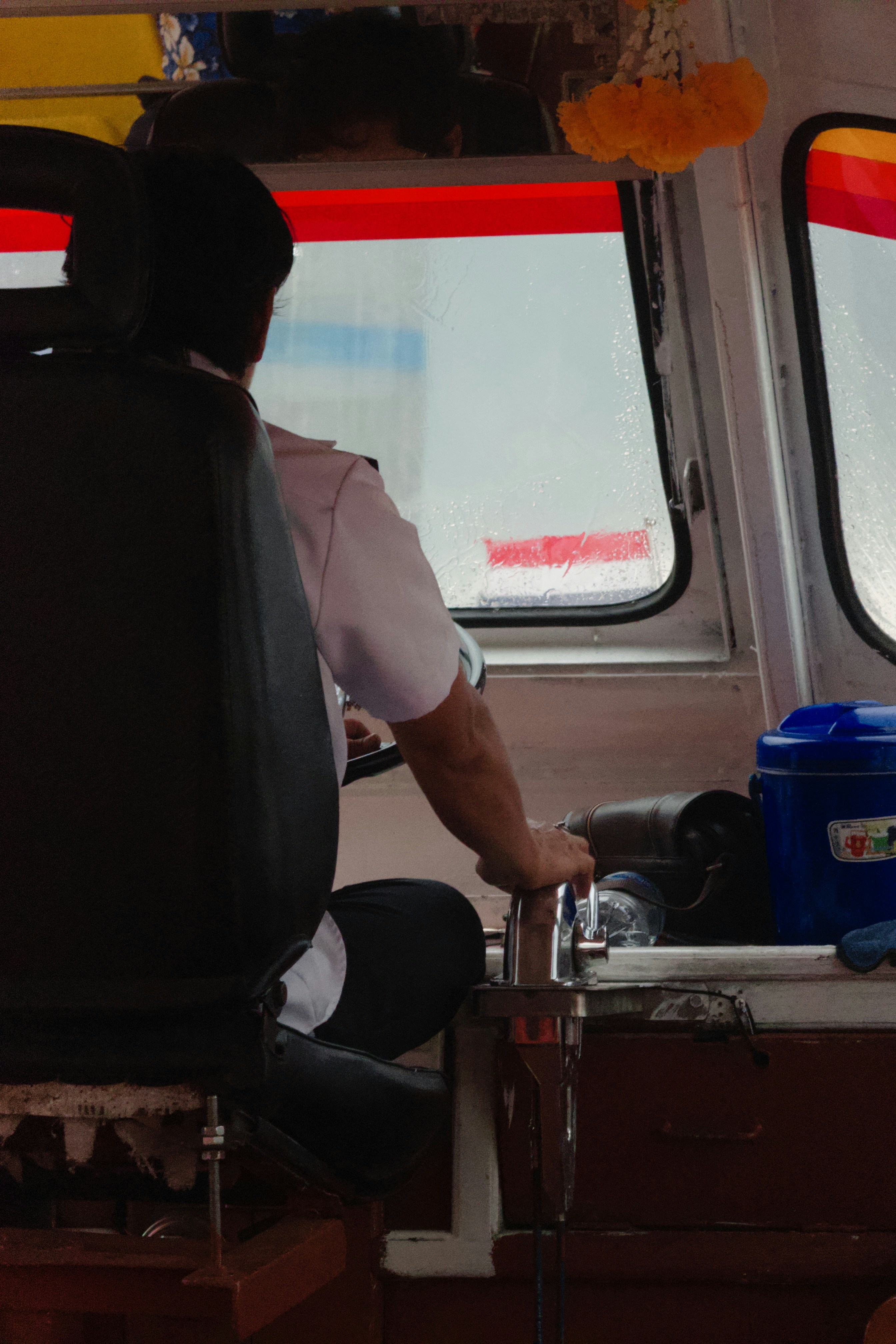 Operator at the Helm: A Bus Cockpit Casual Moment