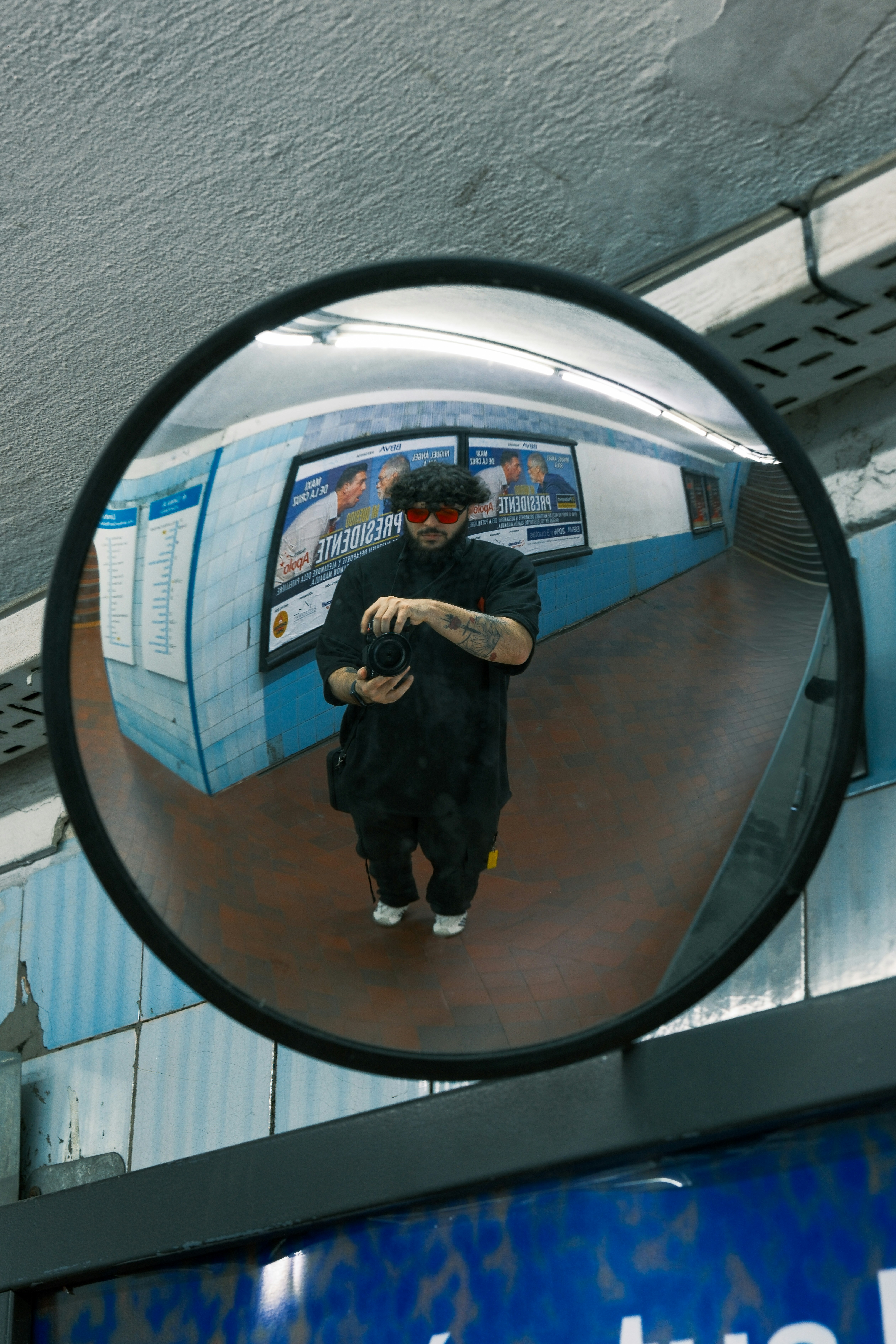 Circular Echo: Subway Self-Portrait in a Distorted Mirror