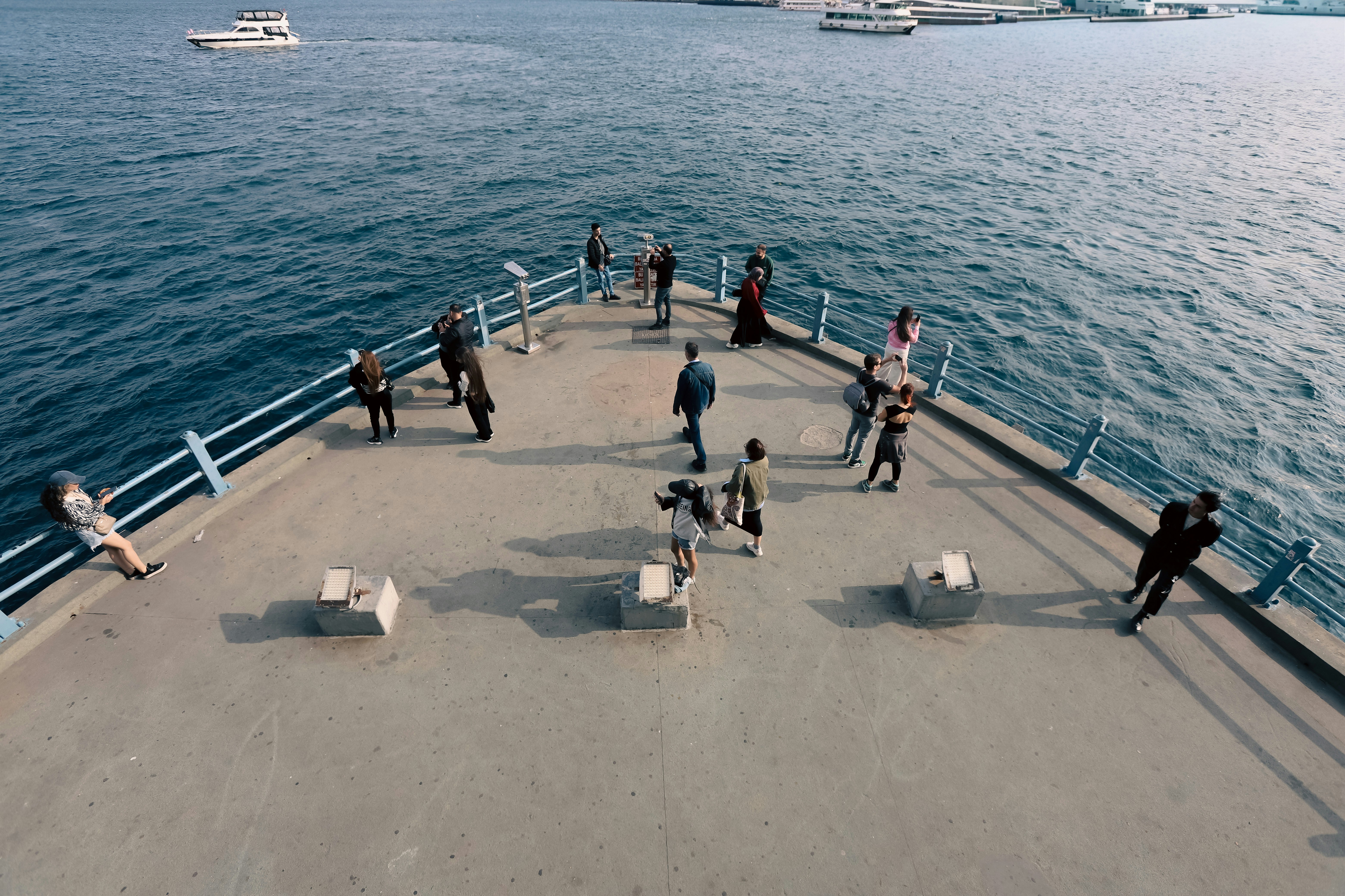 Harbor Assembly: A Drone's-Eye View of a Pier Gathering
