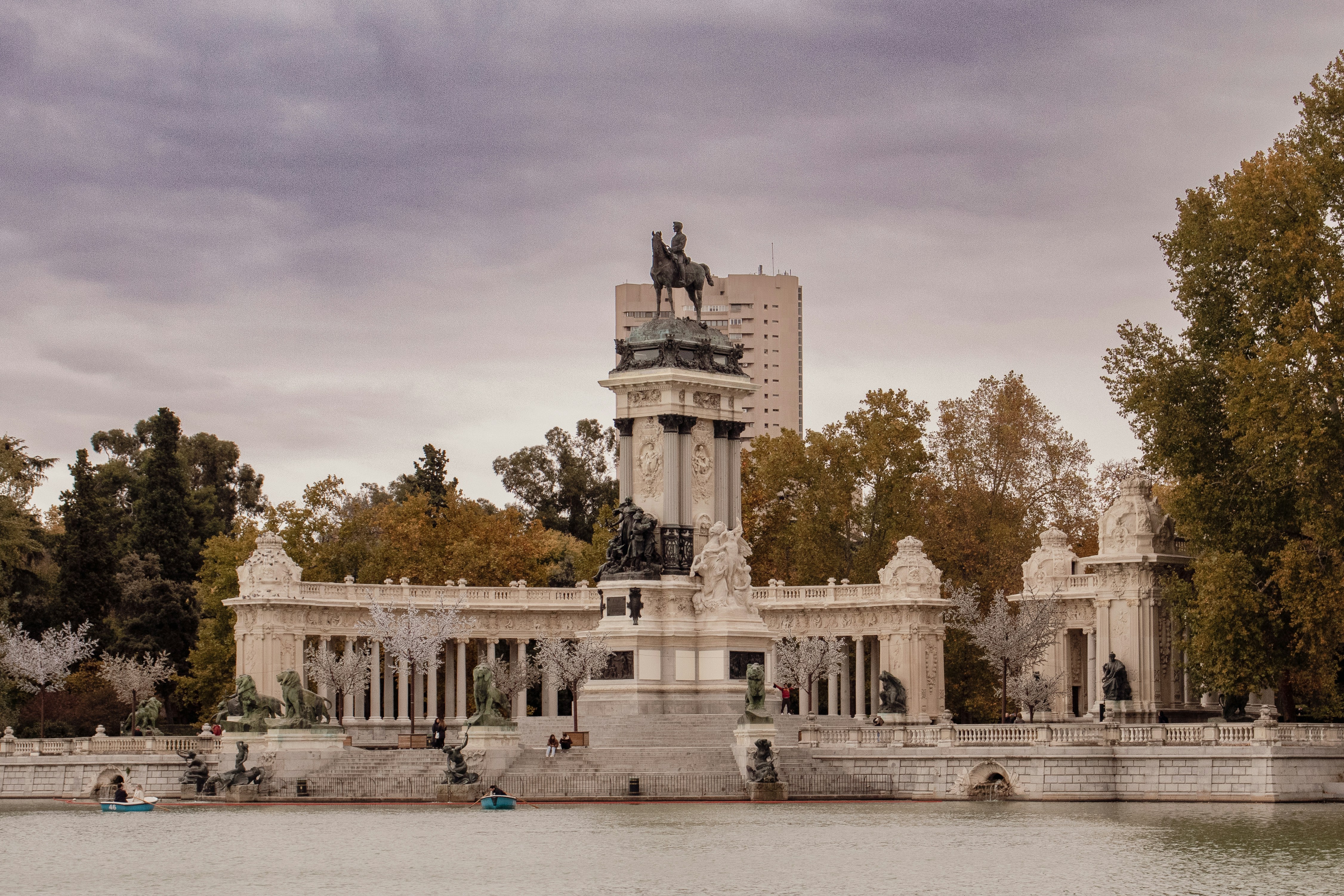 The Great Pond in Madrid’s Retiro Park, rowboats and reflections by the Monument to Alfonso XII.