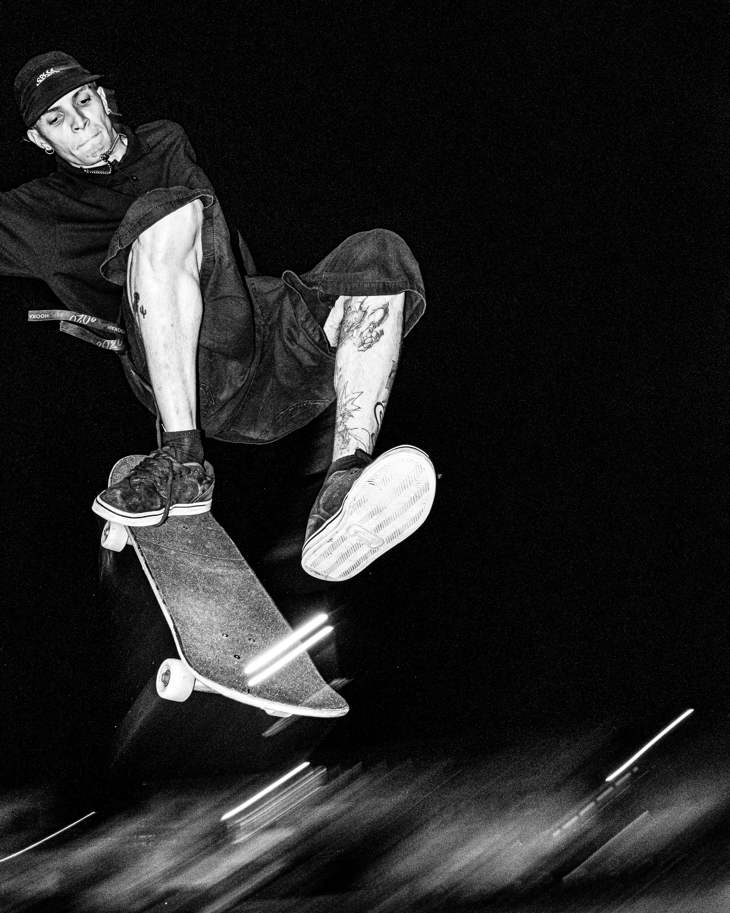 Moment of airborne grace, urban rebellion in monochrome.