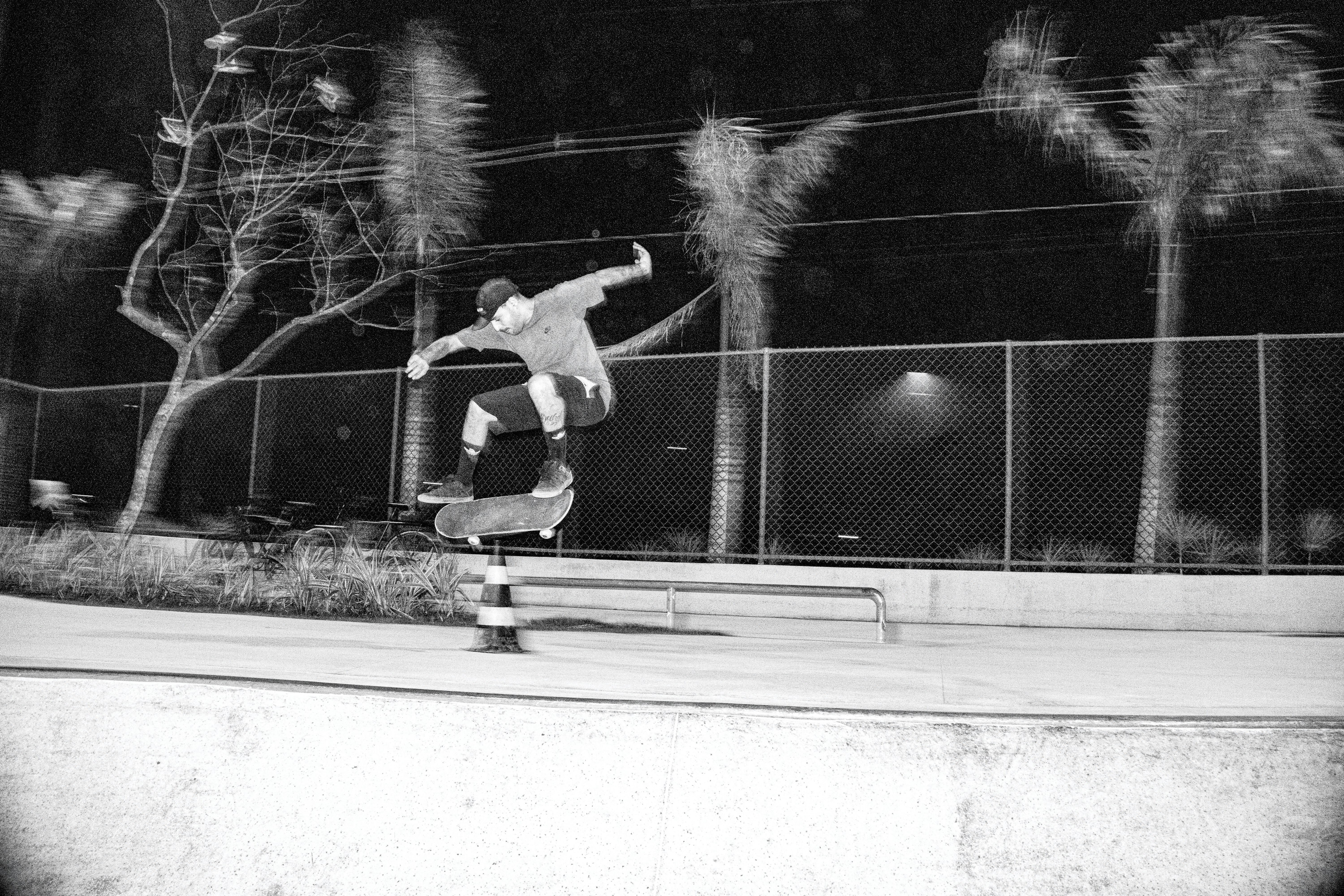Monochrome mastery: a skateboarder's leap, capturing raw urban spirit.