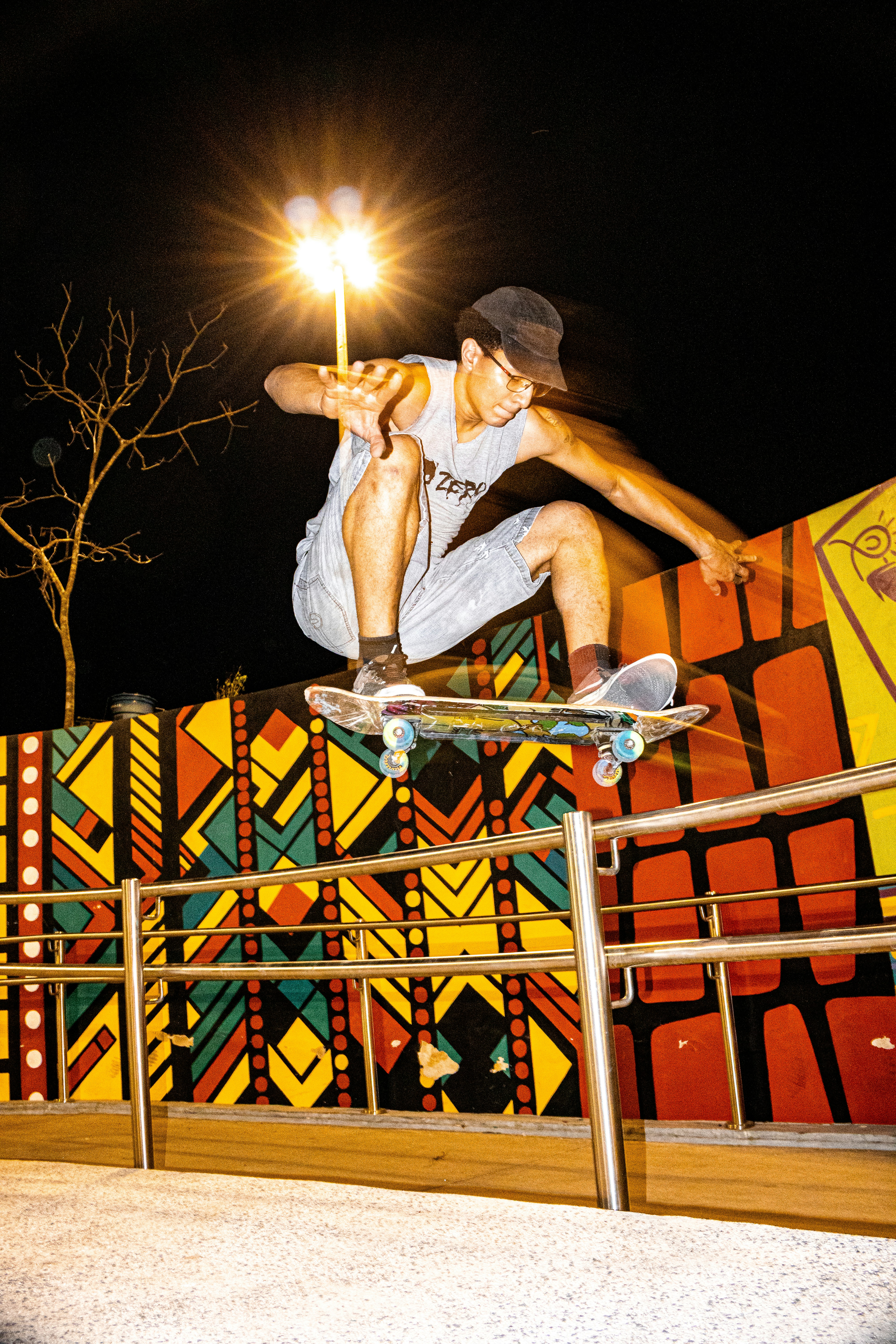 Night skater's airborne moment, a dynamic fusion of movement and art.