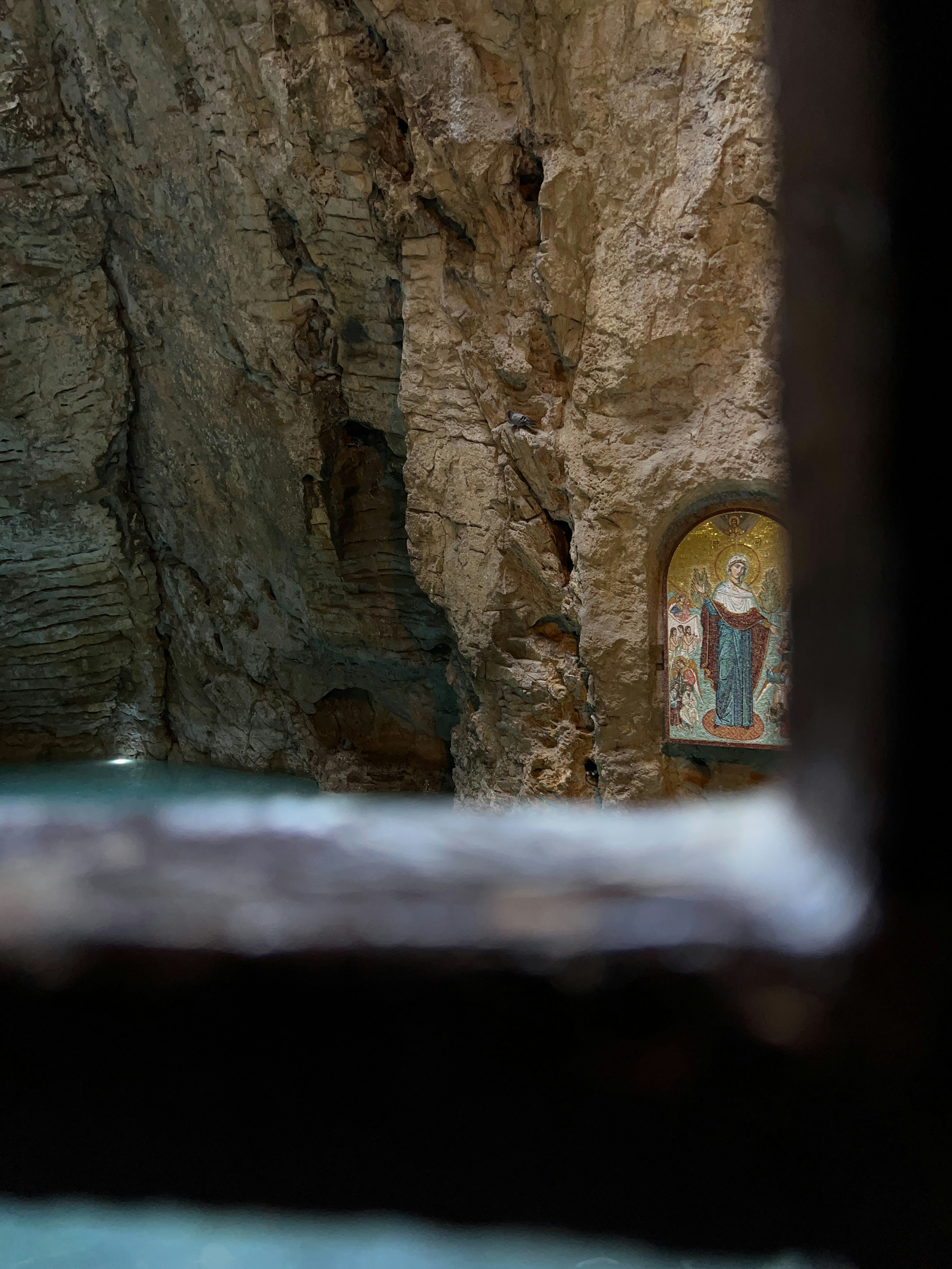 Cragside Icon: A Saint Glowing in a Shadowed Grotto