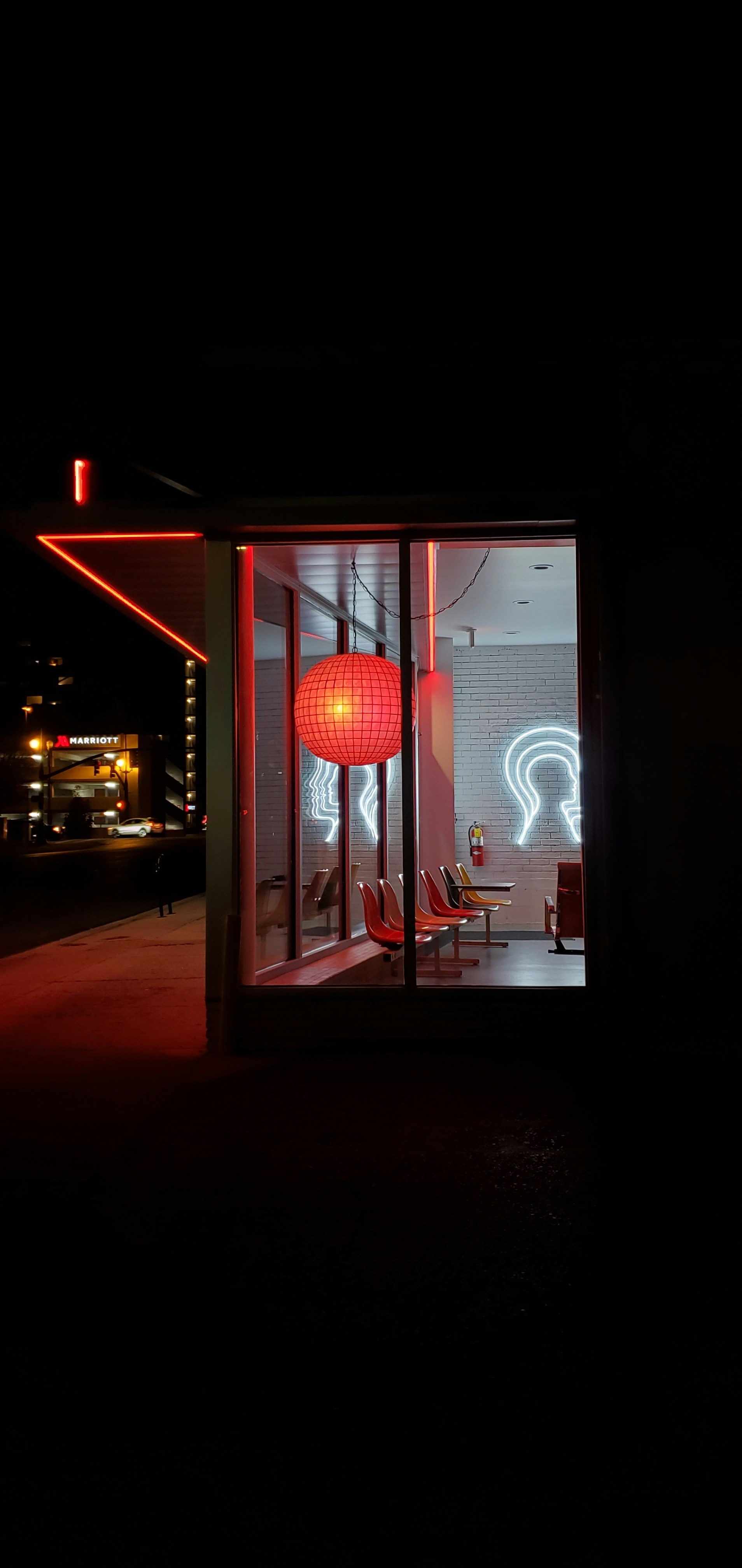 Crimson Lantern and Neon Window: Nightlife in a Quiet Shopfront