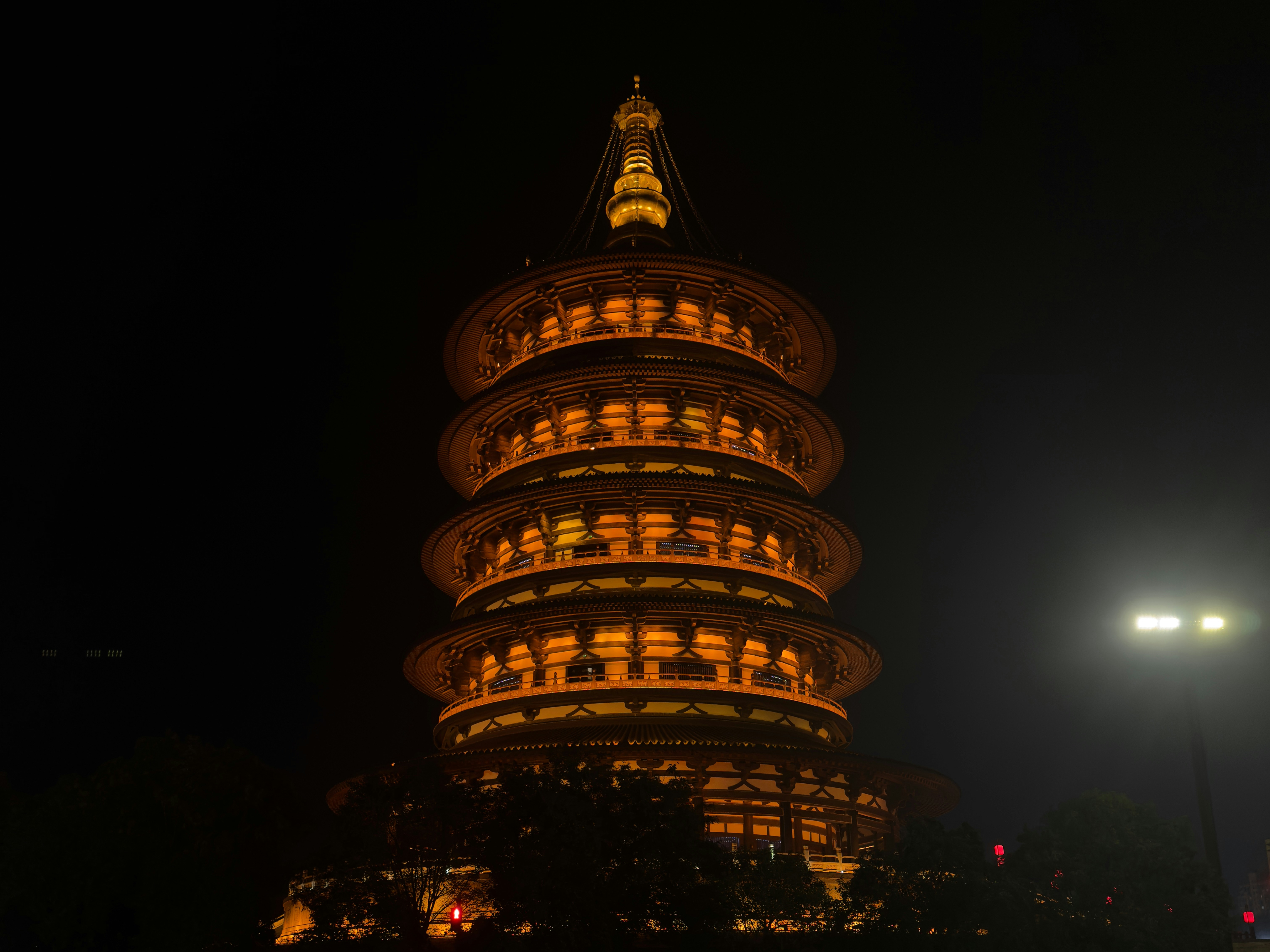 Bronze Lanterns: The Night Pagoda Illuminated in Layered Warmth