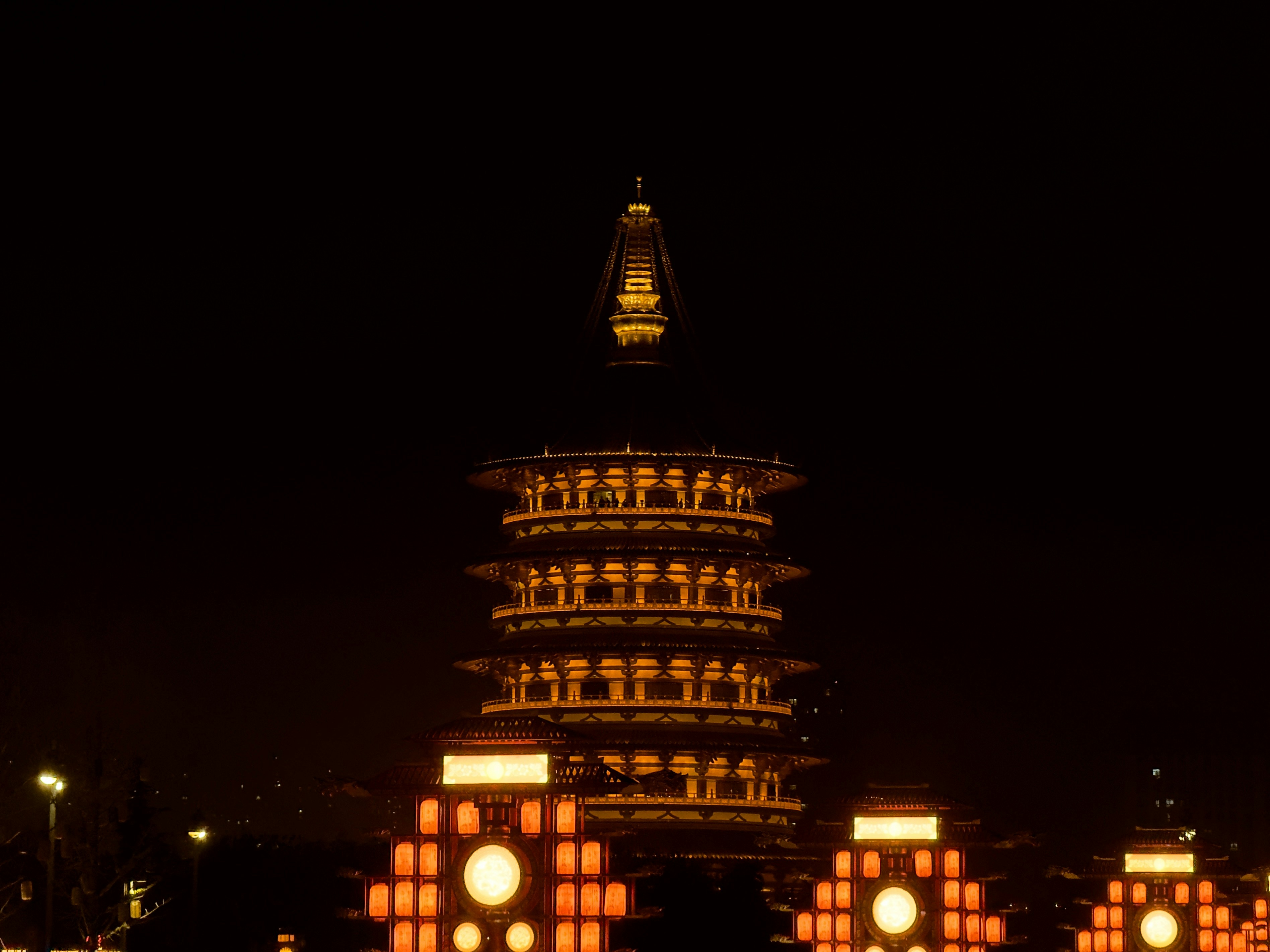 Golden Lanterns Rise: Night-Tier Pagoda in Amber Glow