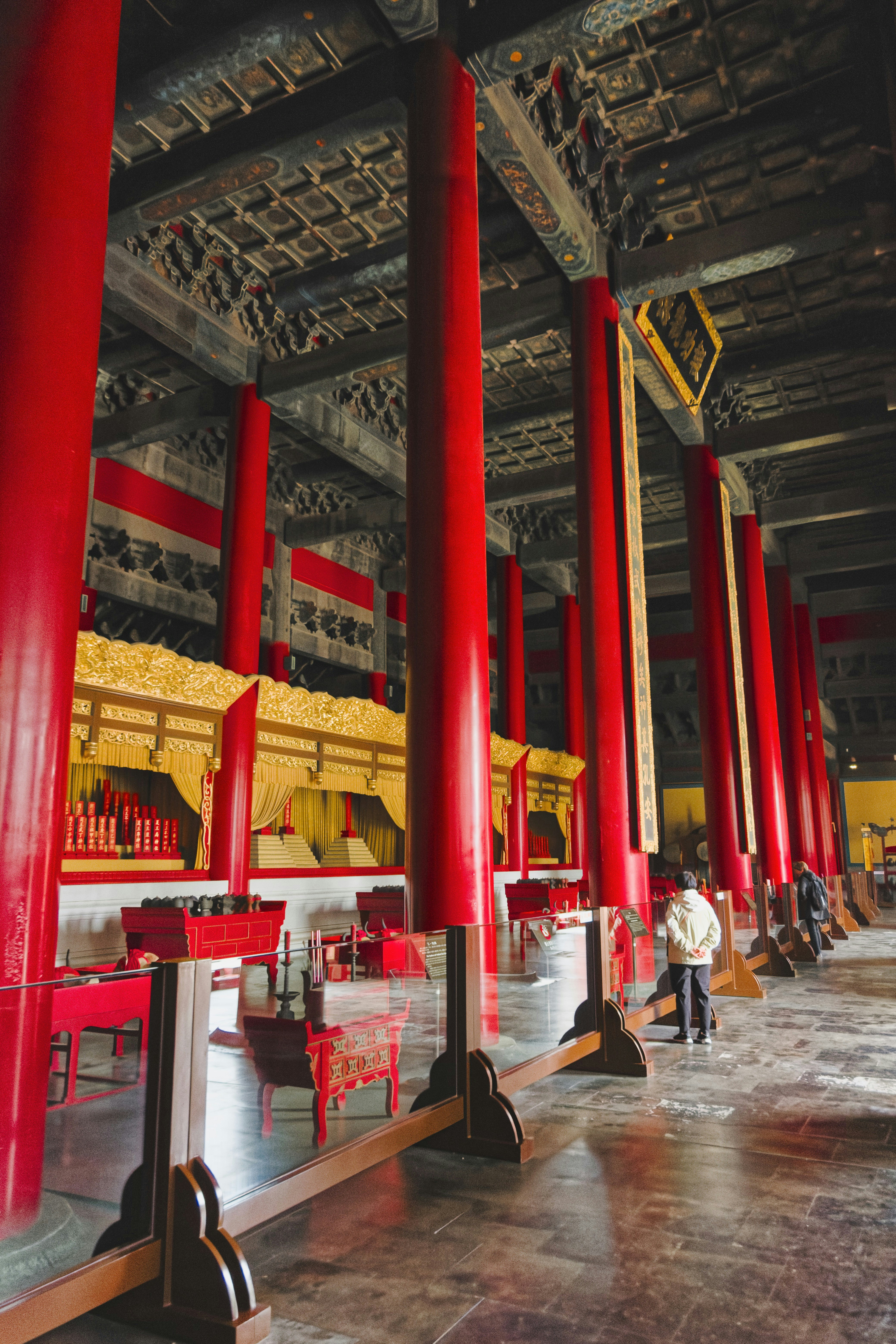 Crimson Columns, Golden Altar: A Temple Corridor in Rich Hue