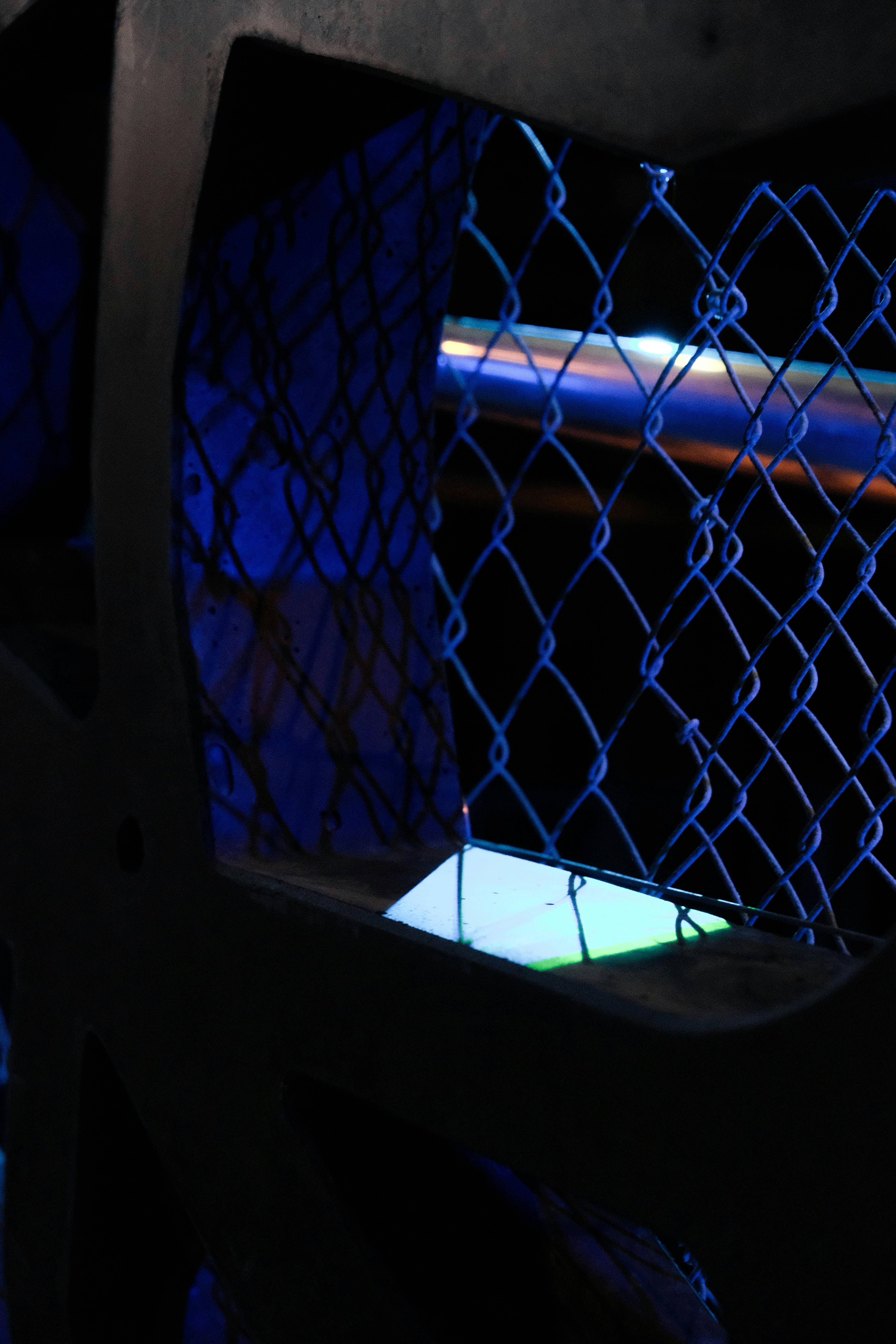 Neon Blue Lattice Behind a Midnight Frame