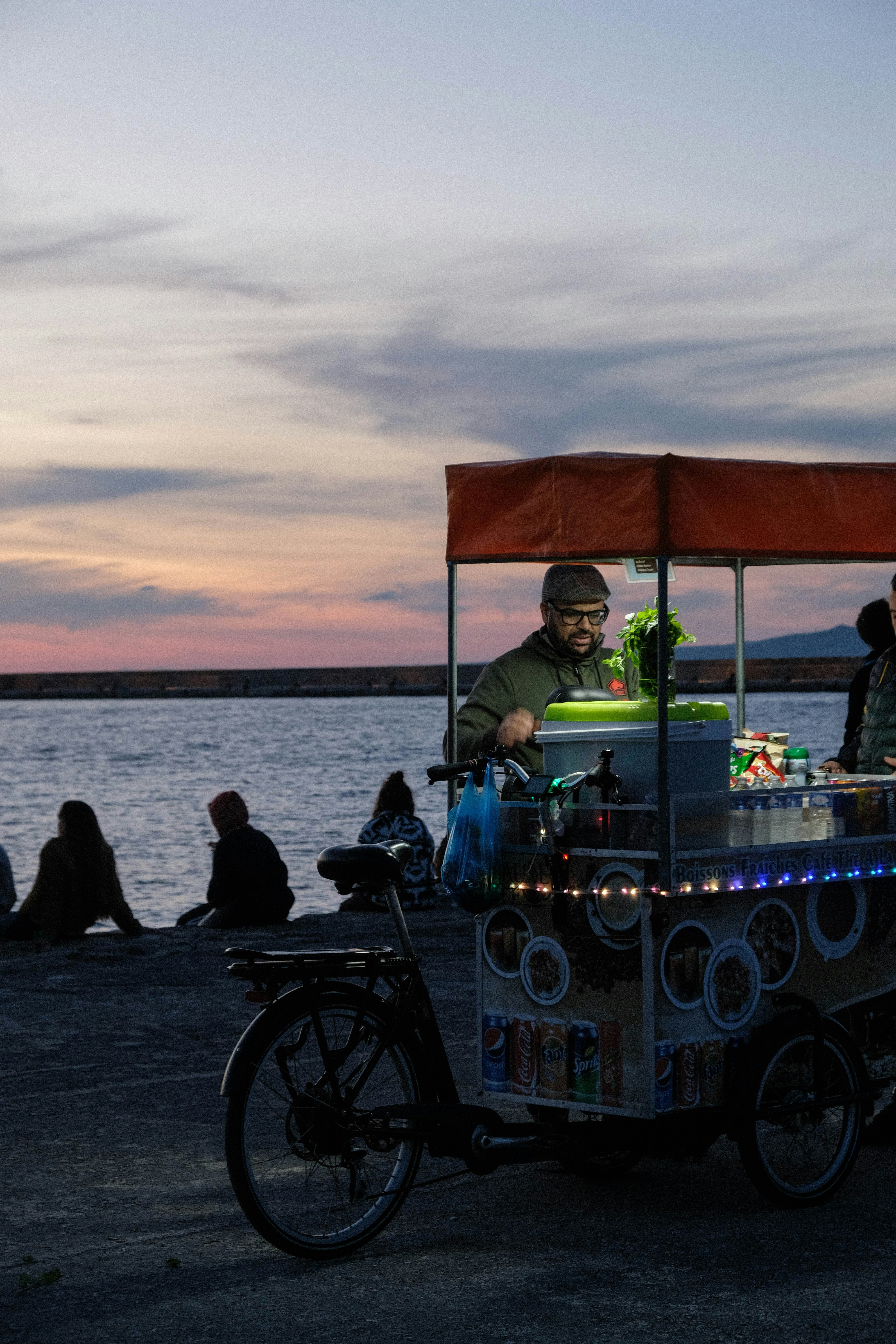 Dusk Harbor Vendor: Neon-Lit Street Cart by the Sea