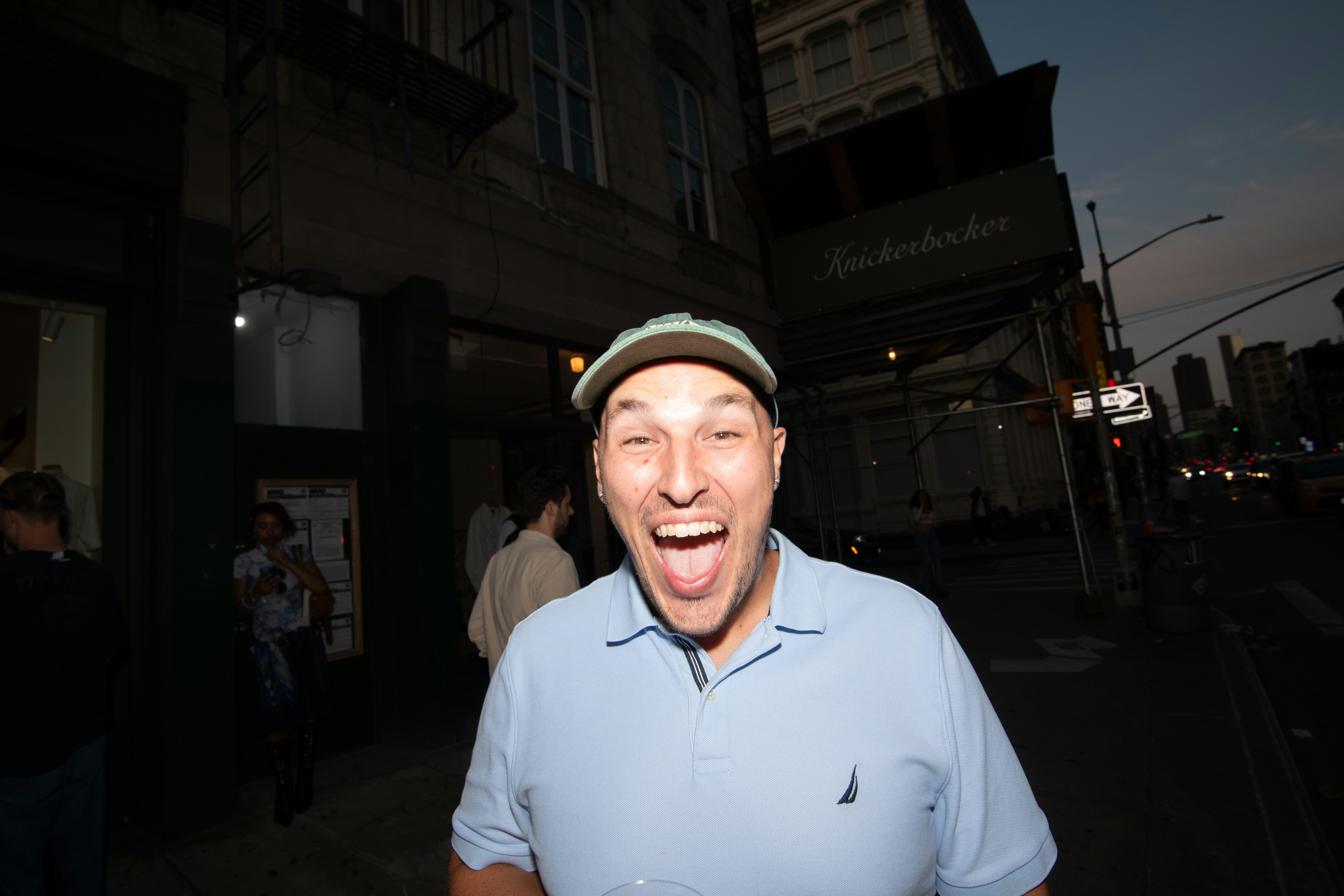 Midstreet Joy: Close-Up Portrait Under Neon Dusk