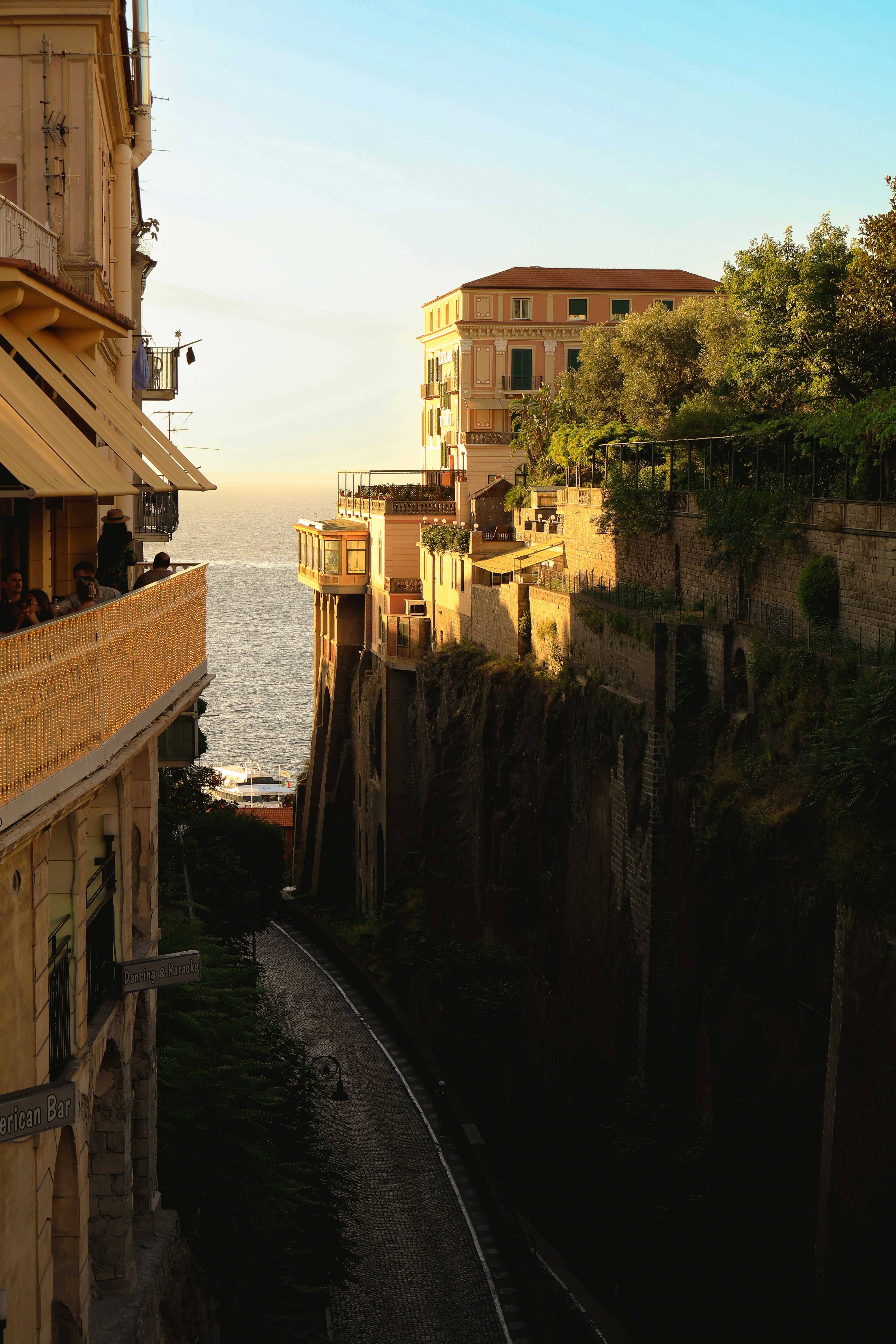 Terraced Coastal Path at Golden Hour: A Quiet Descent to the Sea