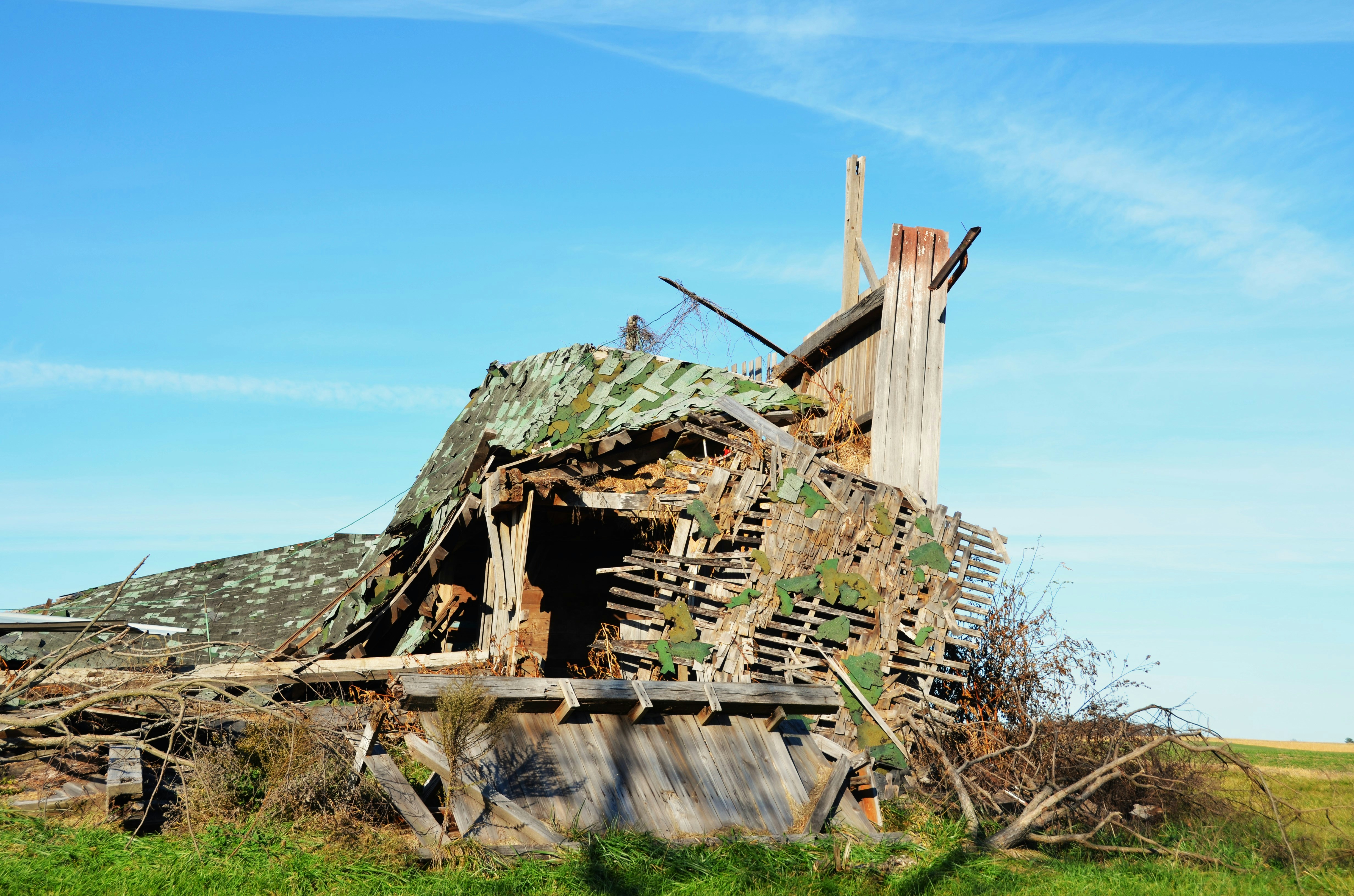 Skeletal Prairie Homestead Beneath a Cerulean Sky