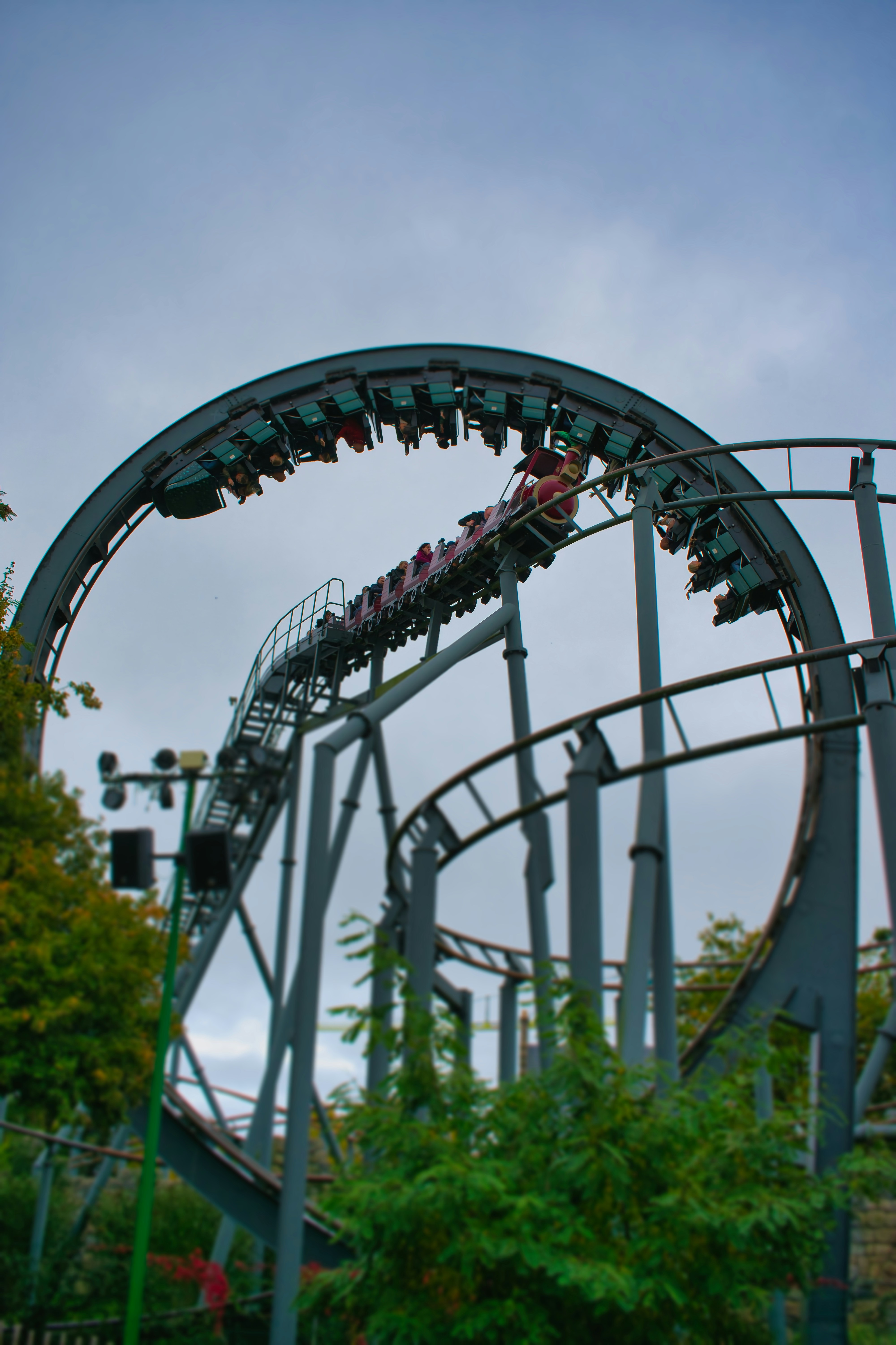 Roller coaster train on a loop with riders photo – Free Adventure Image ...