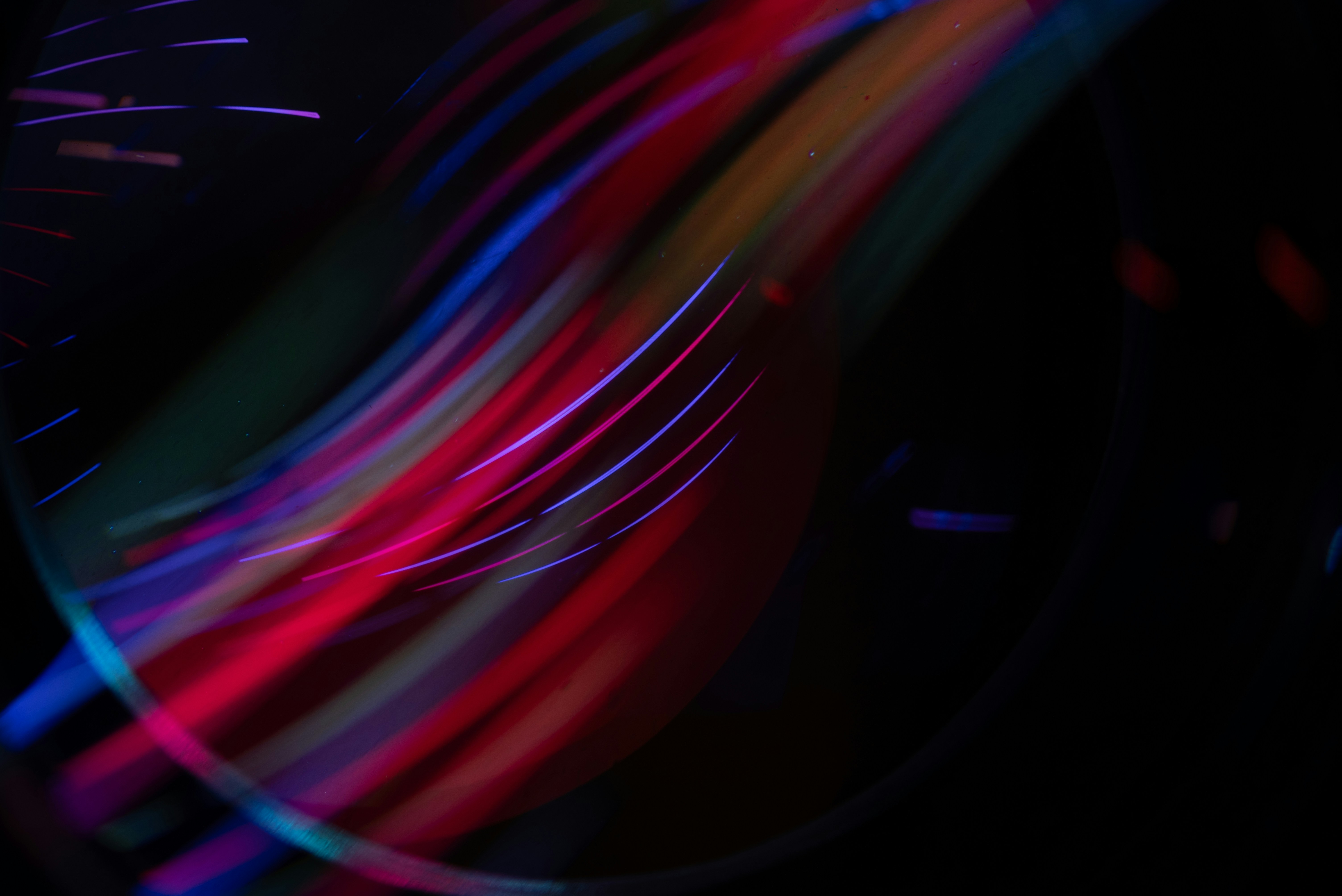 Abstract streaks of colorful light on black background photo – Free ...