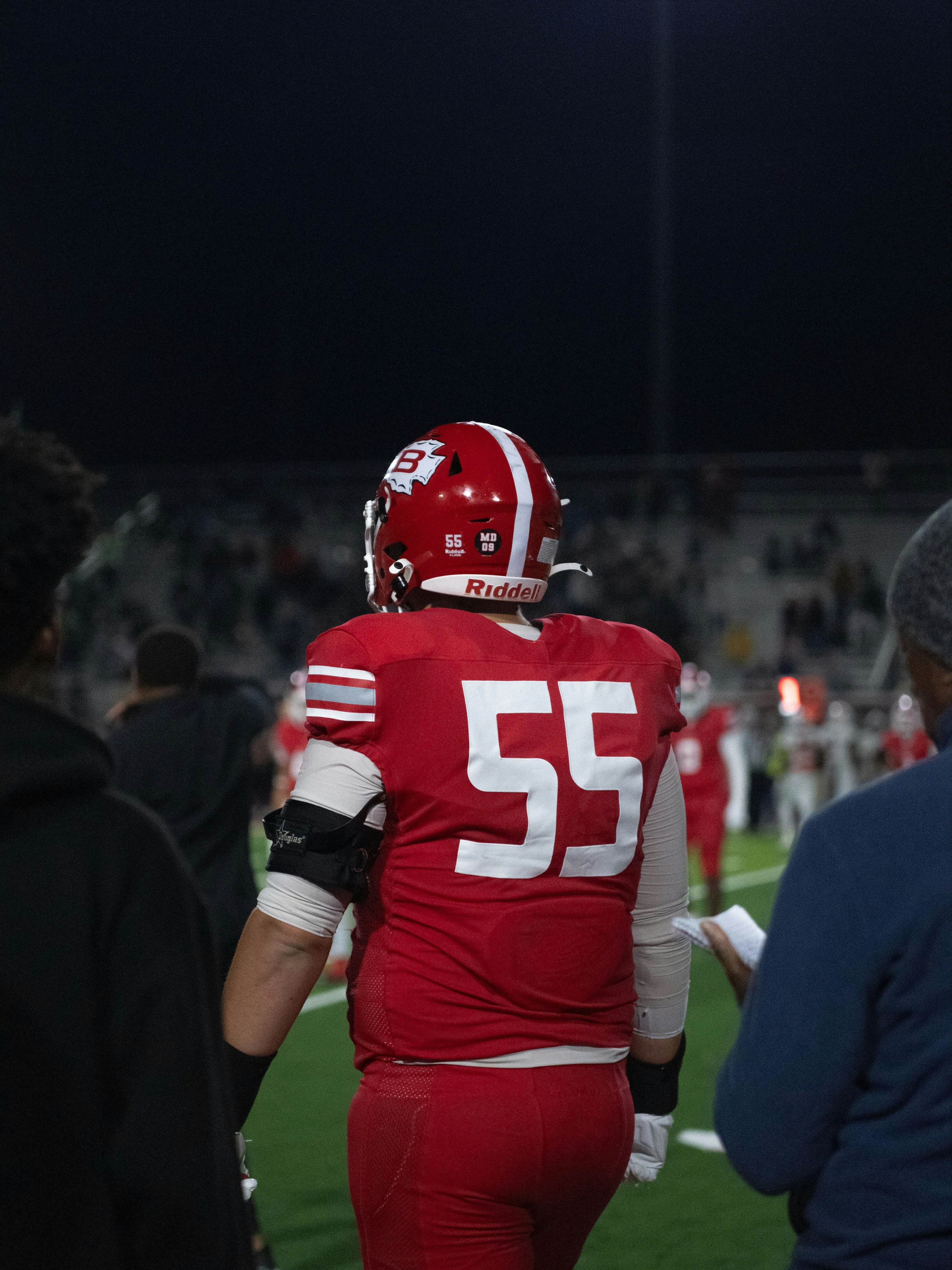 Night Lights, Red Jersey: Number 55 Guards the Backfield