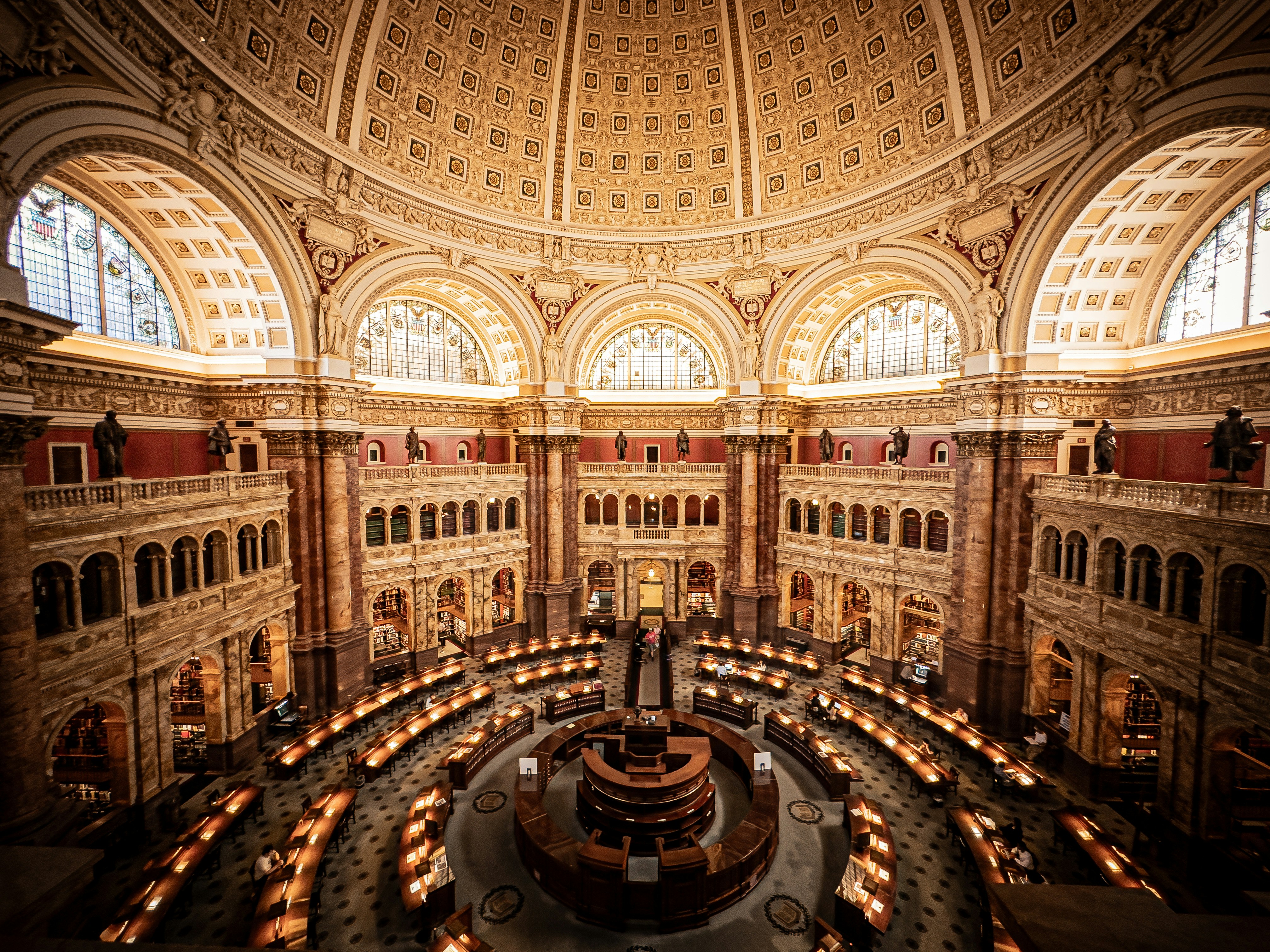 Amber Cathedral: Circular Reading Hall Bathed in Warm Light