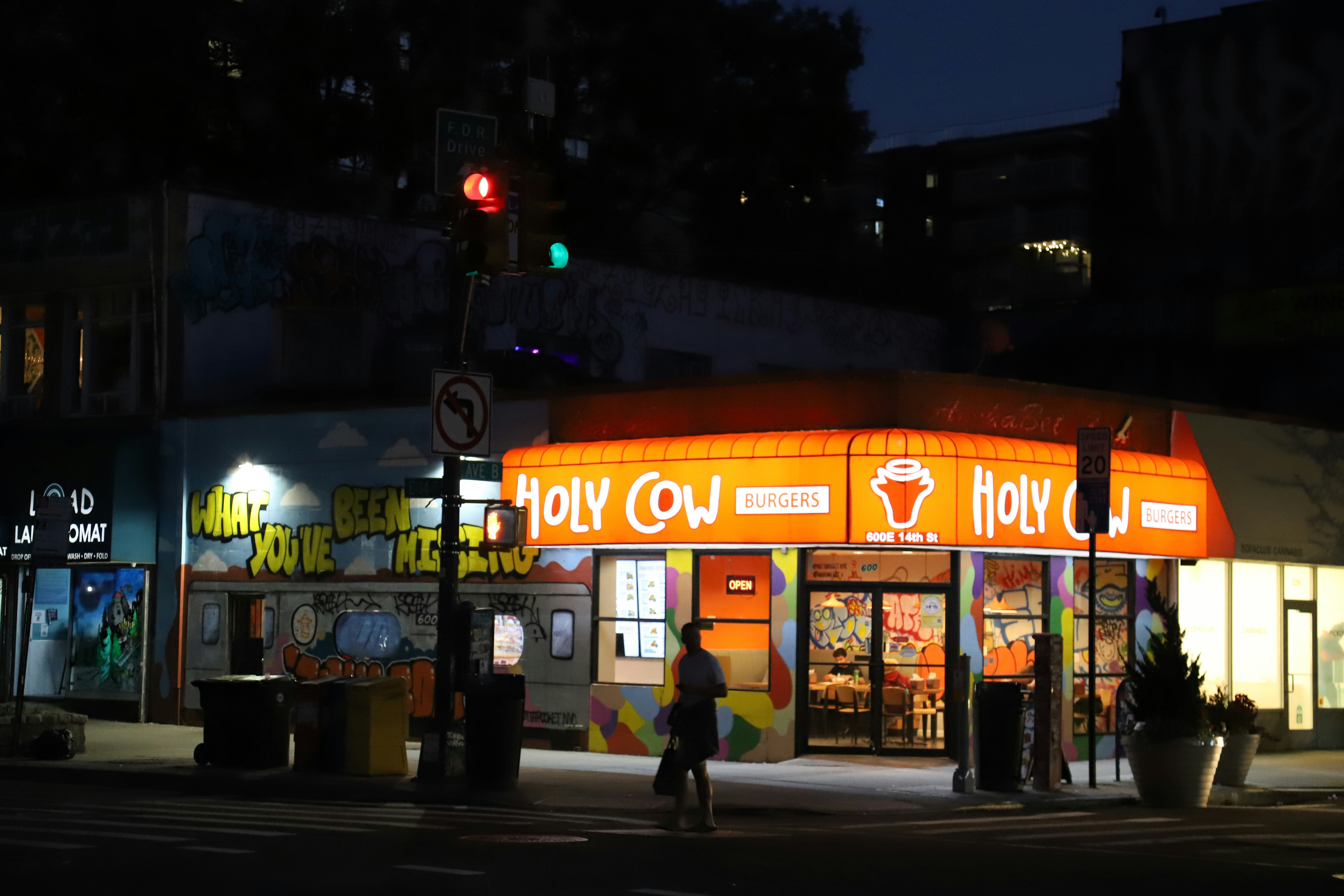 Neon Amber at Night: Holy Cow Diner Illuminates a Quiet City Block