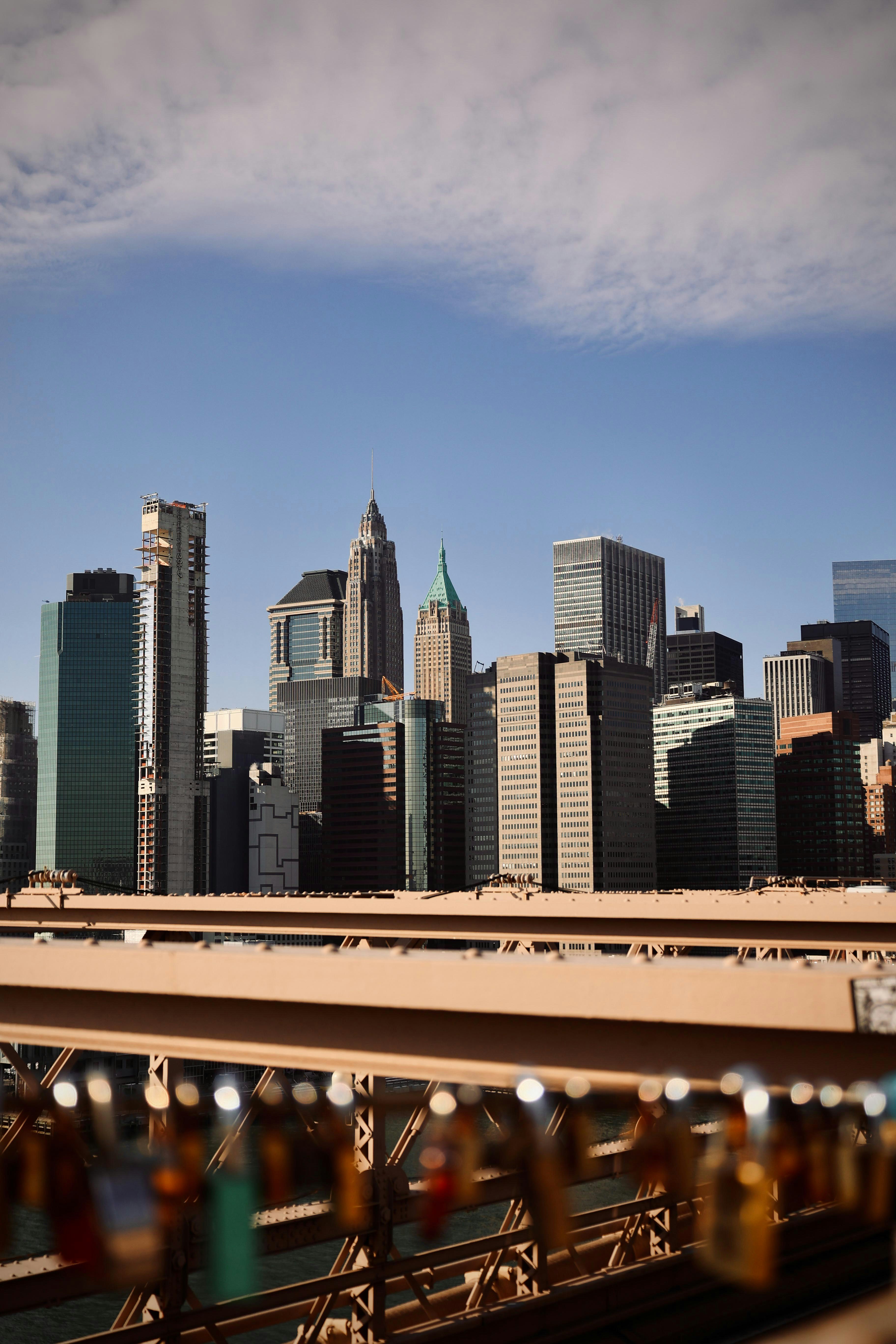 Love Locks Framing a Manhattan Skyline at Midday