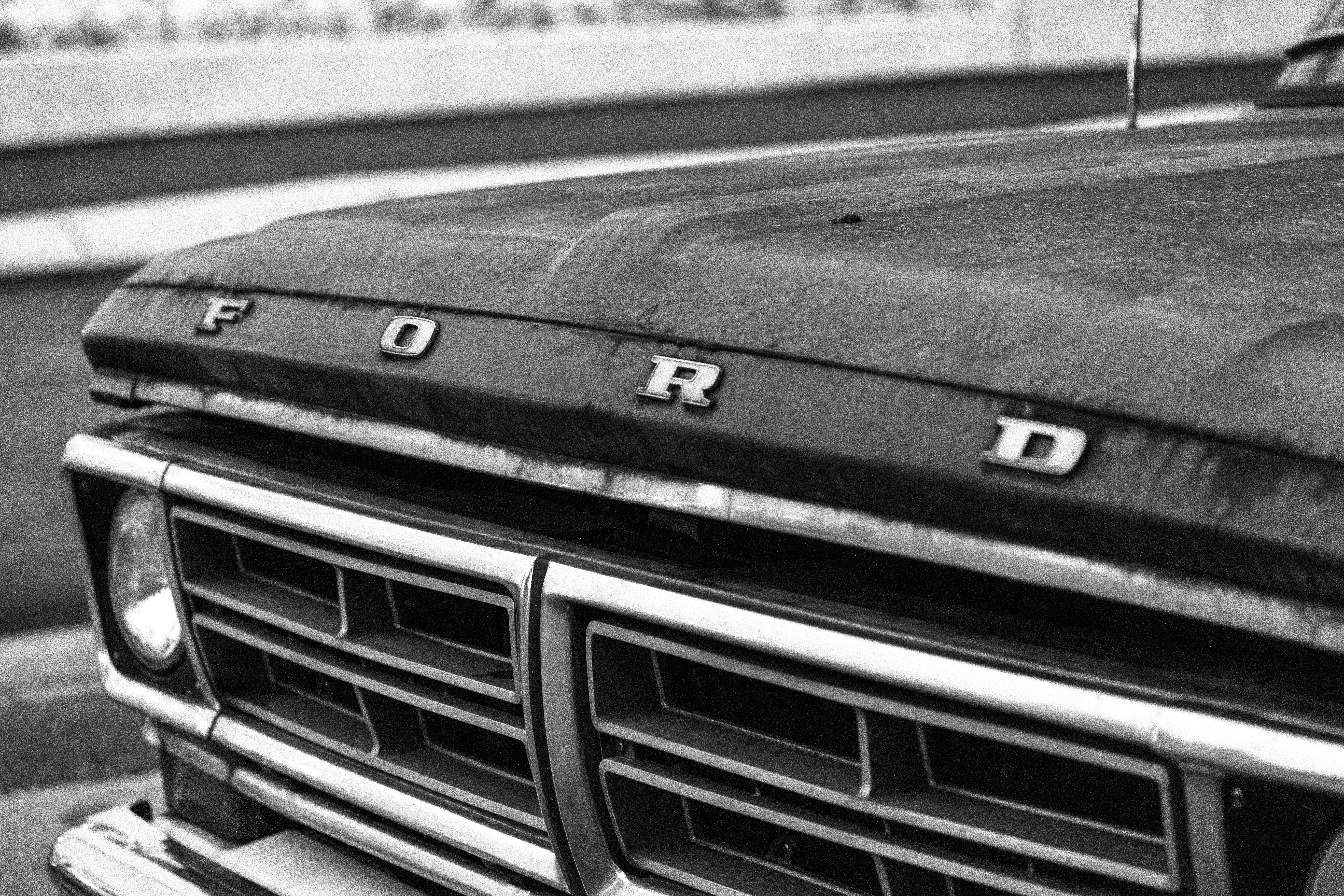 Weathered Ford Front: Close-Up on Hood Letters and Chrome Grille