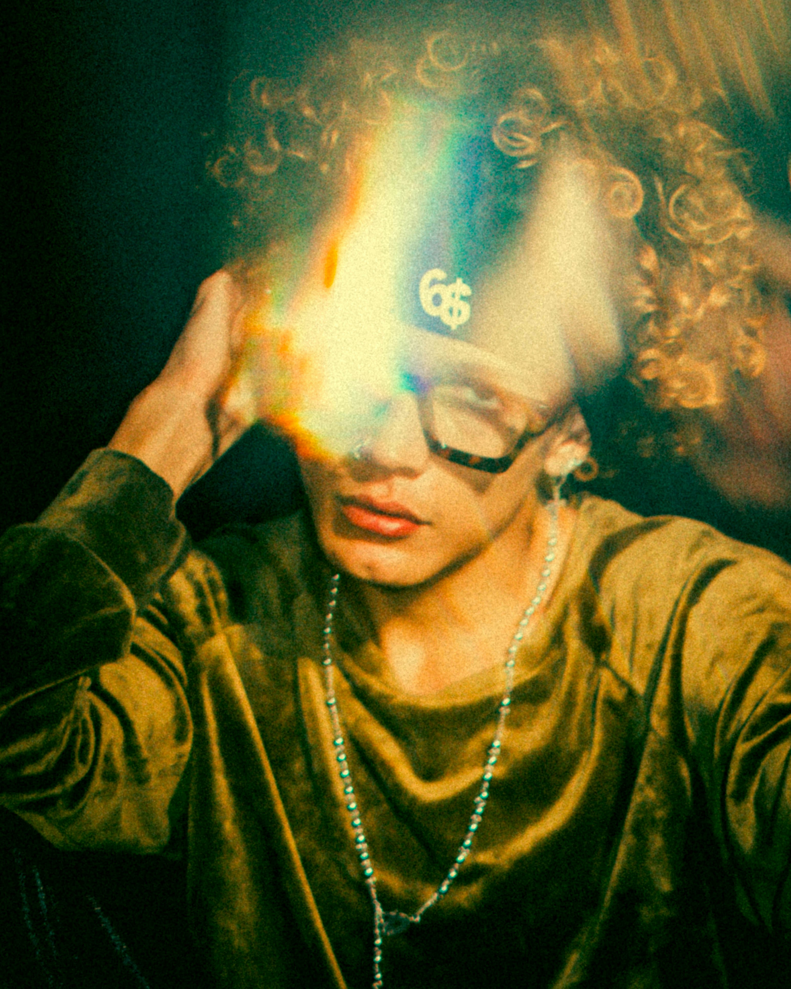 Halo Through Glass: Portrait Shrouded by a Light Flare