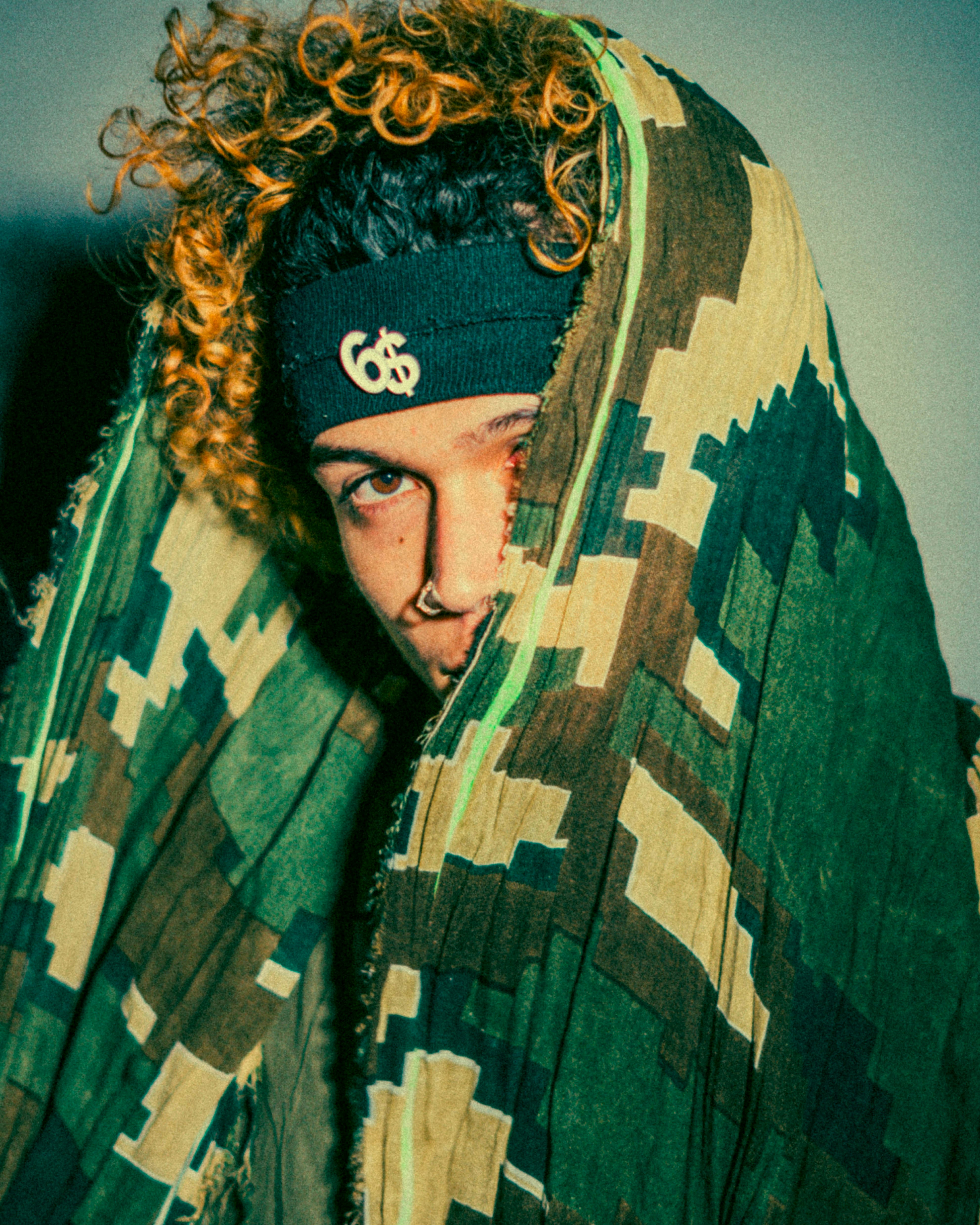 Glimmer Through the Camouflage: A Gaze Beneath a Patchwork Mantle
