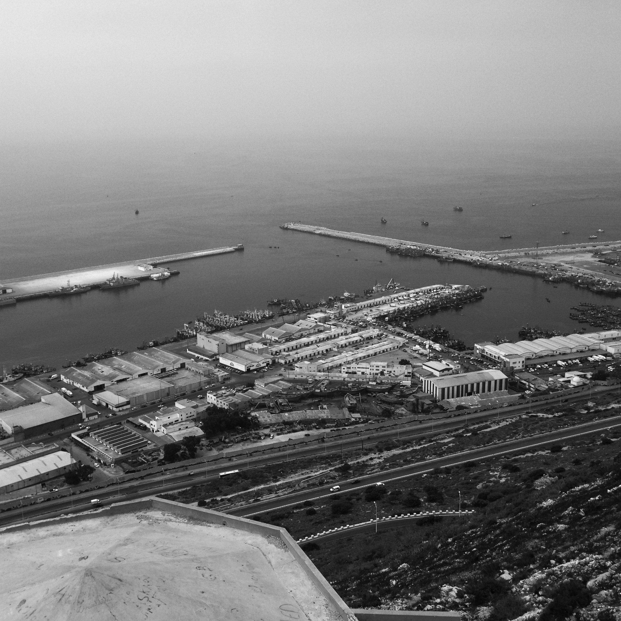 Harbor Grid from Above: Docks and Industrial Wharf at Low Tide