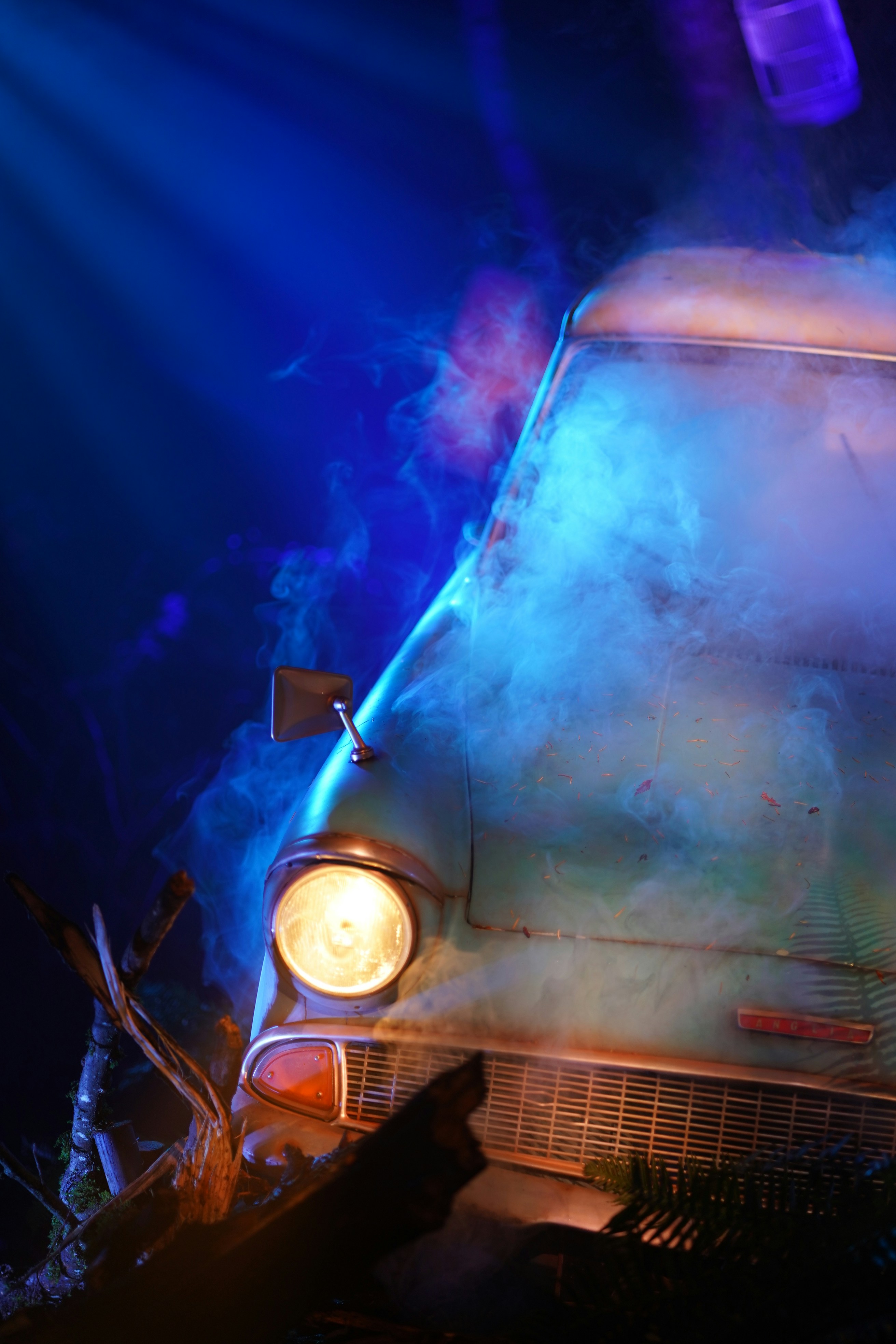 Azure Fog over a Rusted Front: Night Car in Neon Smoke