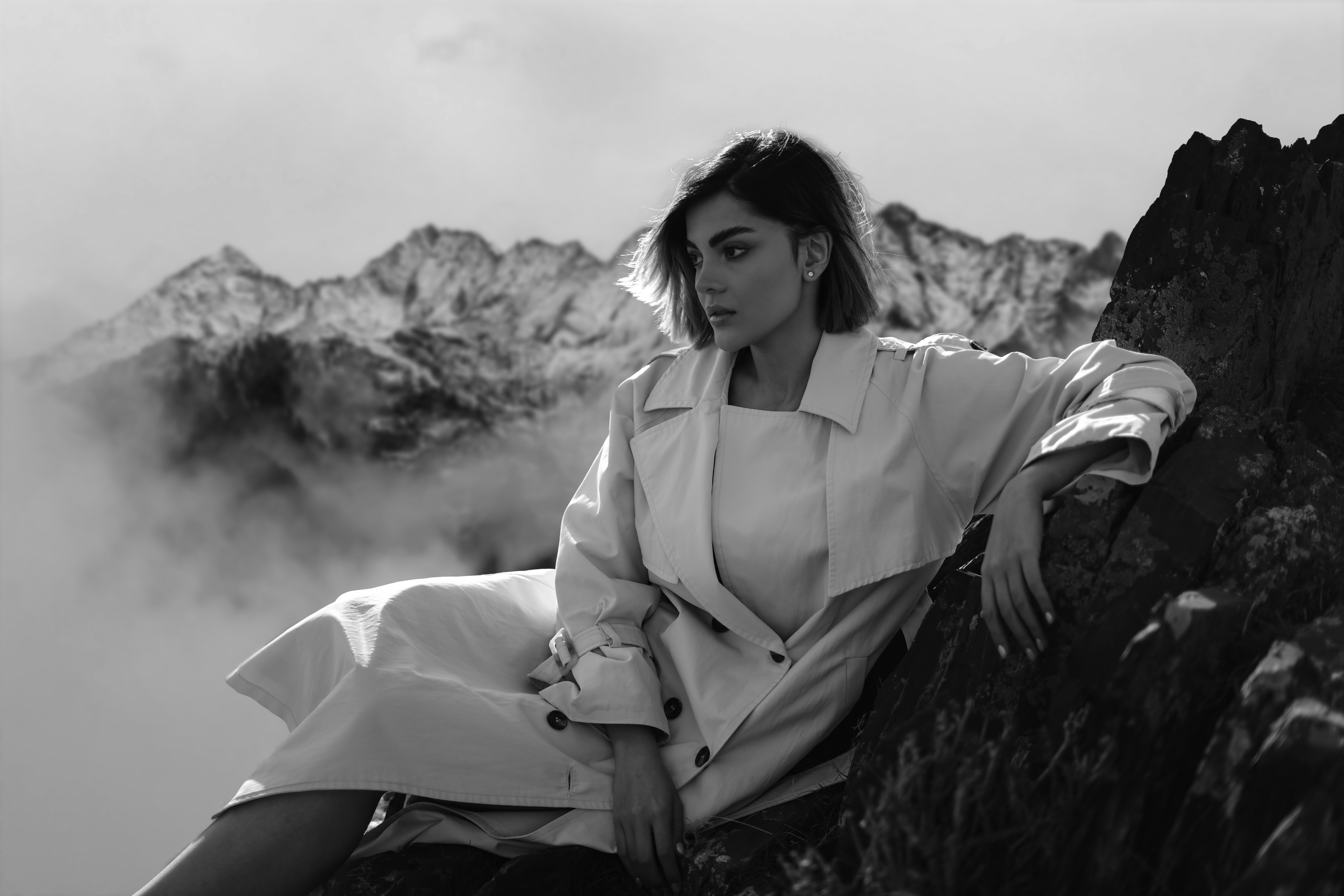 Alpine Edge: A Monochrome Portrait on the Rock