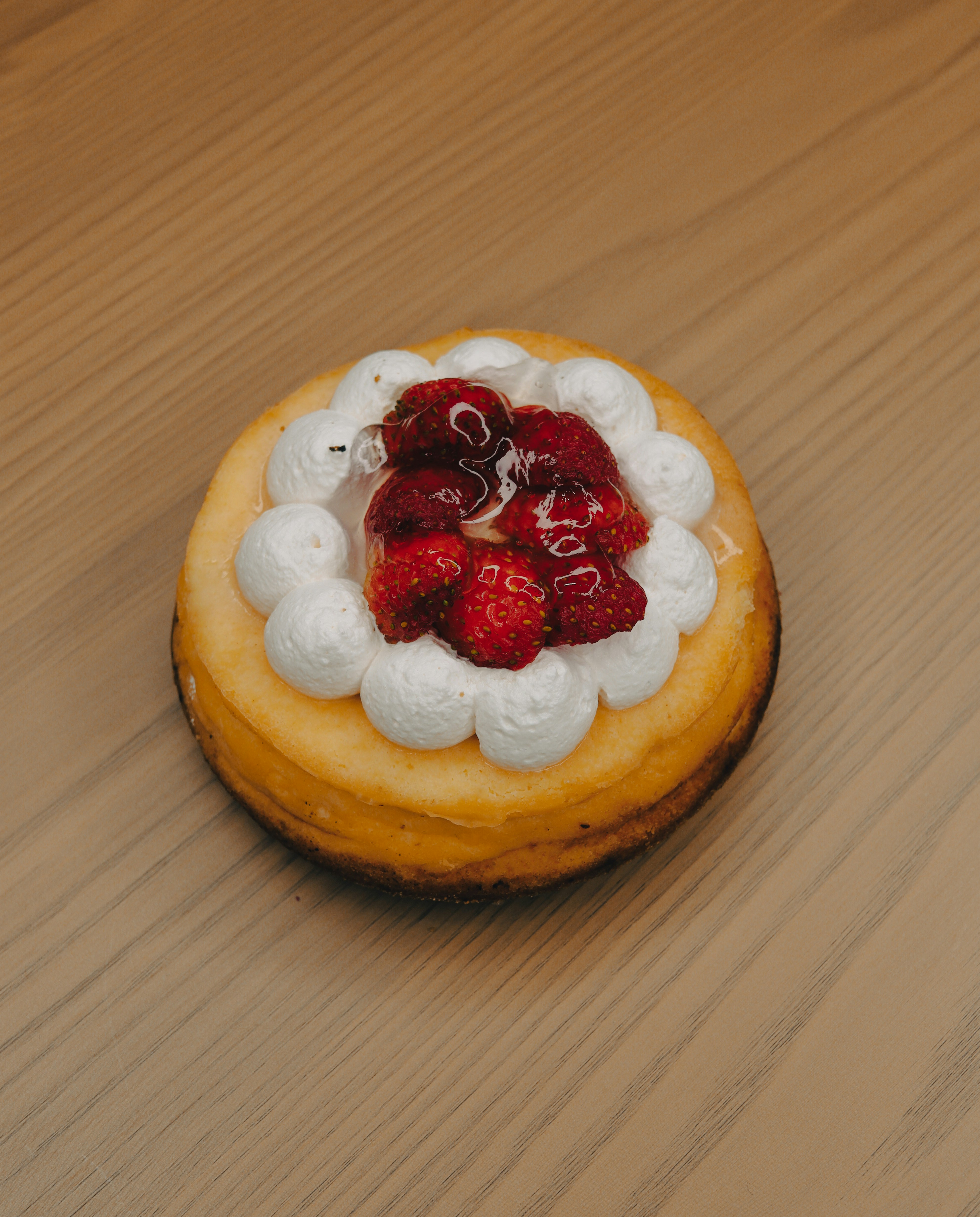 Raspberry Crown Tart: Cream Rosettes Embrace a Ruby Center