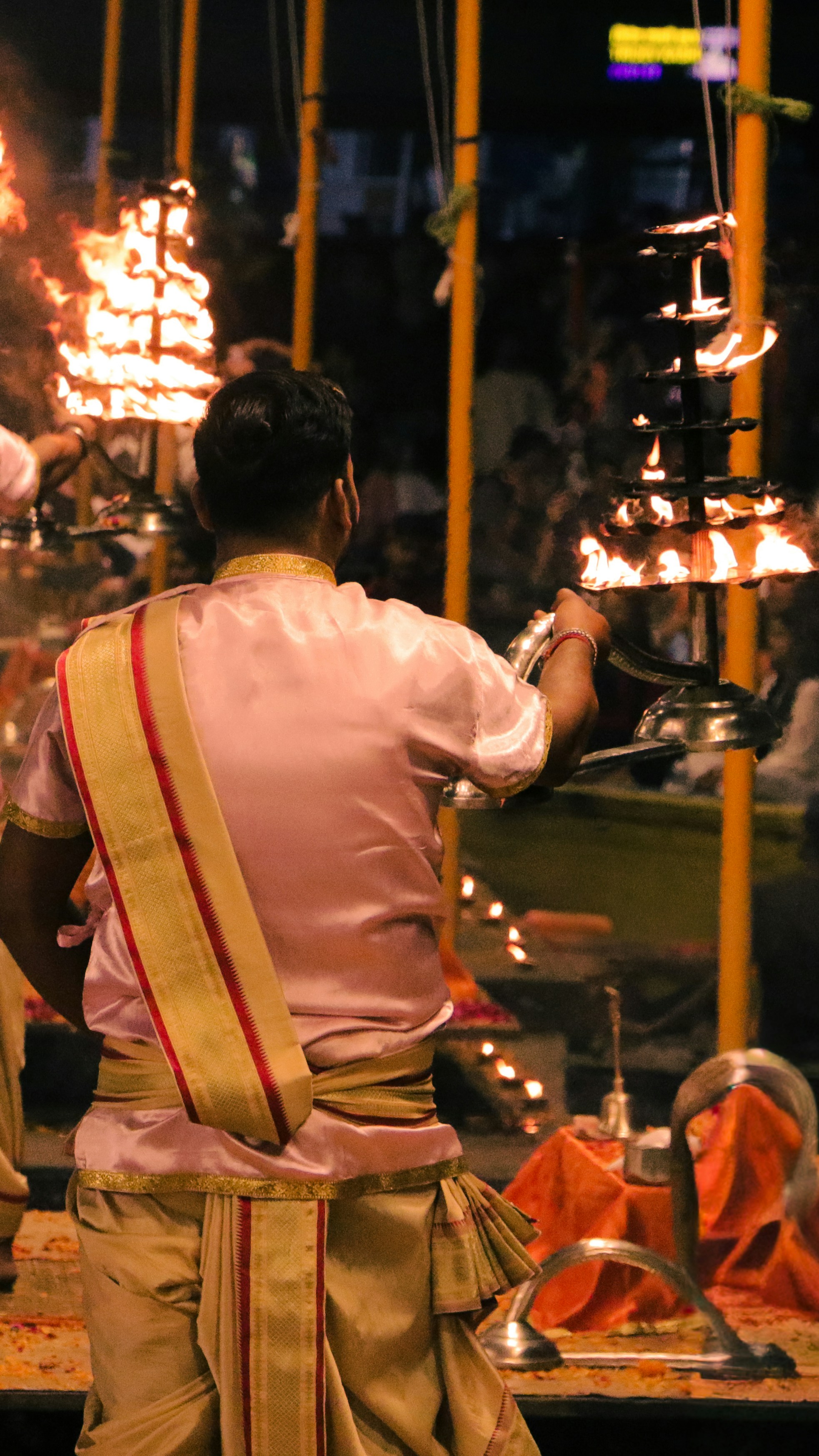 Flame-Woven Reverence: Back-Turned Ritualist at a Night Fire Ceremony