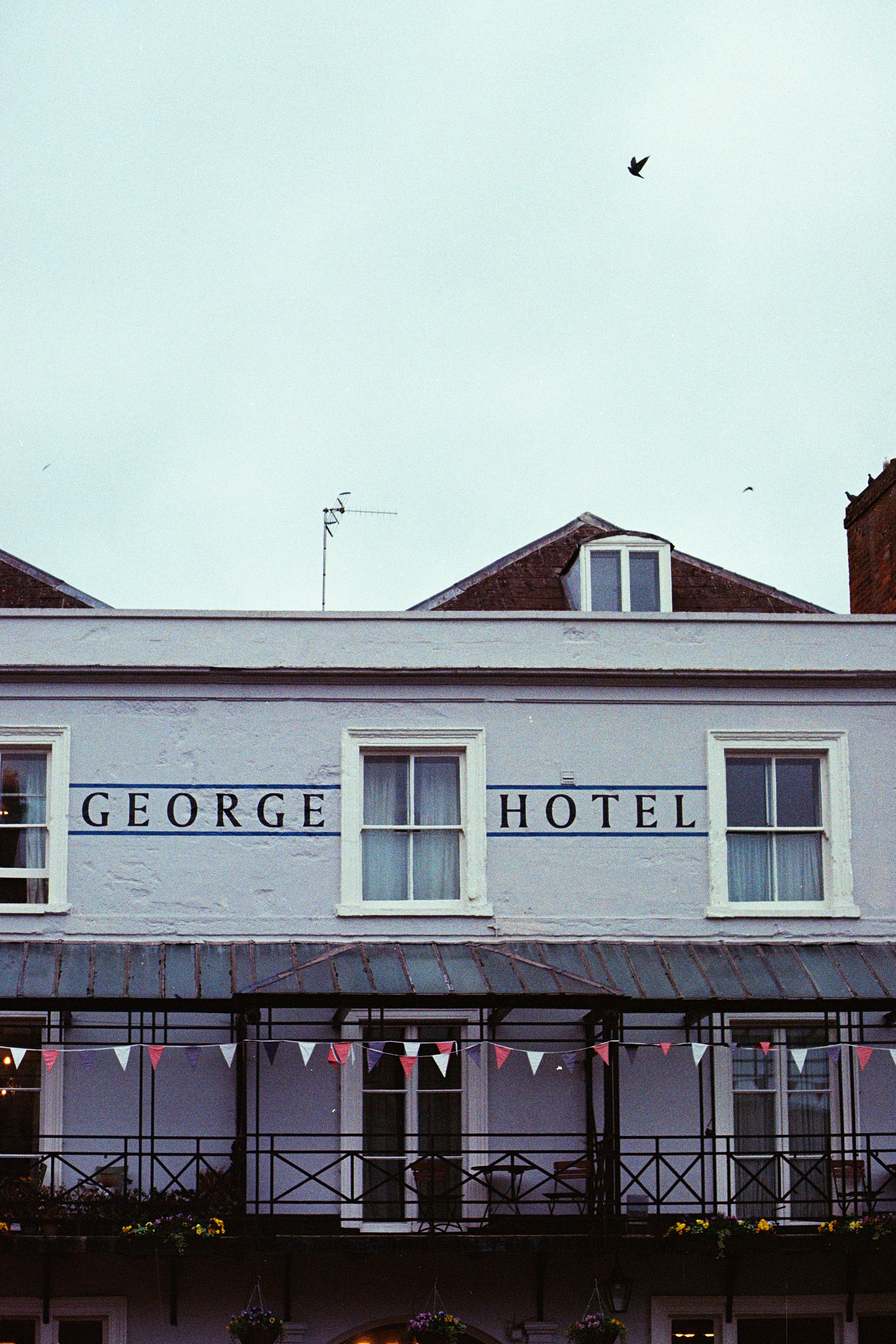 George Hotel Facade in Pale Blue with Festive Bunting