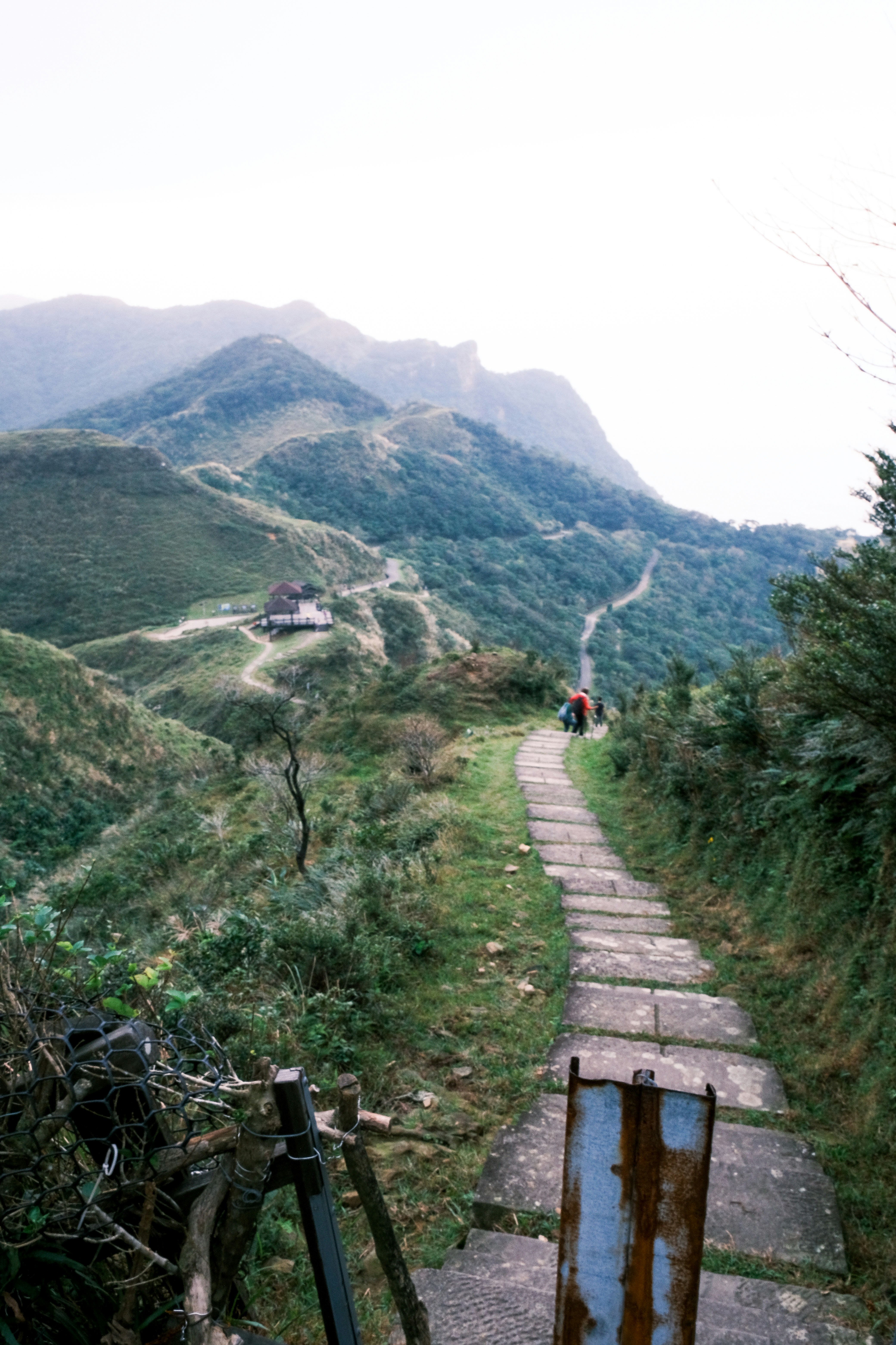 Stone Steps Toward the Cloudline: A Quiet Ascent Above the Valley